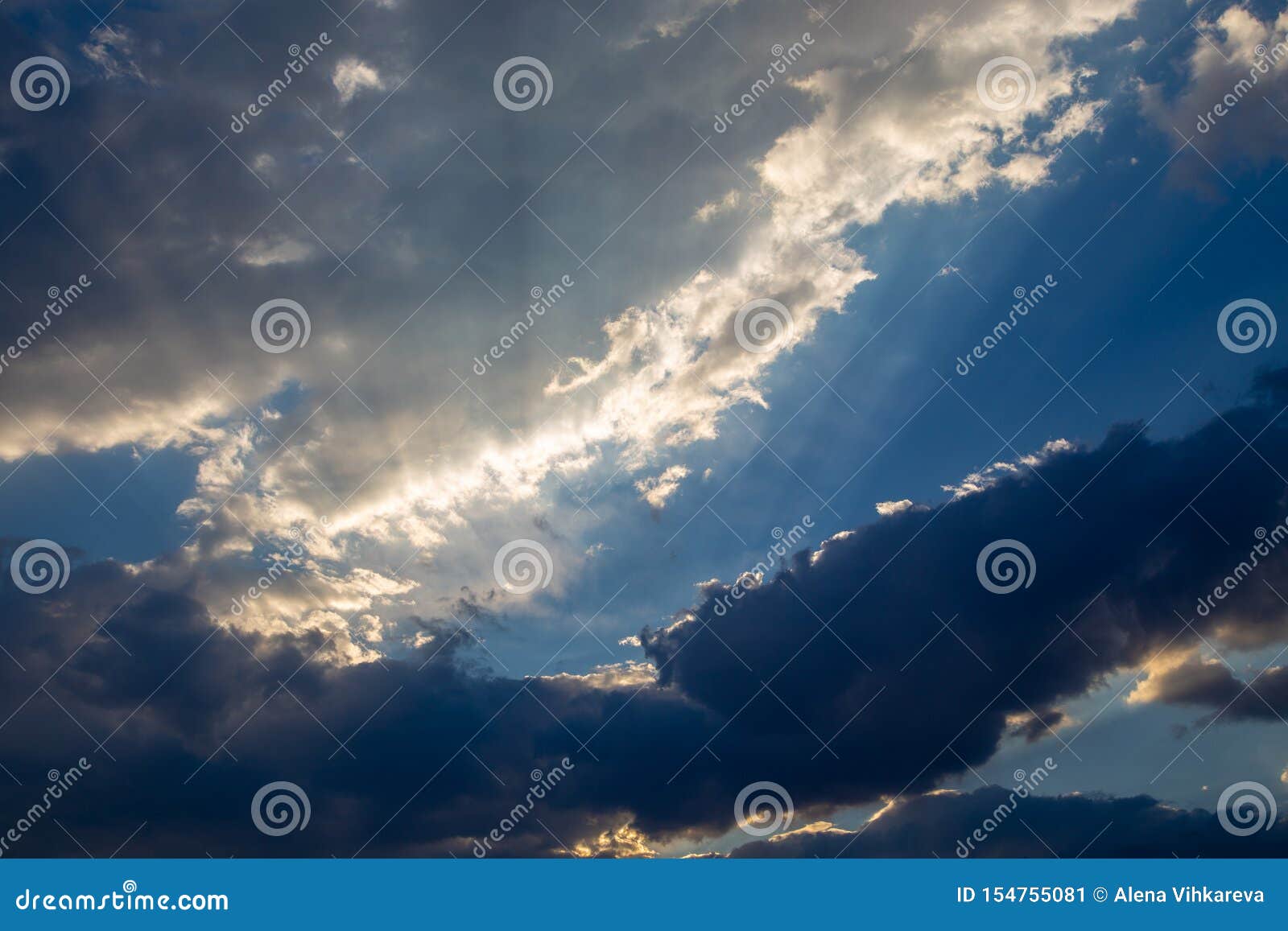 Blue Sky with Clouds Backlit by the Soft Rays of the Sun. Natural ...