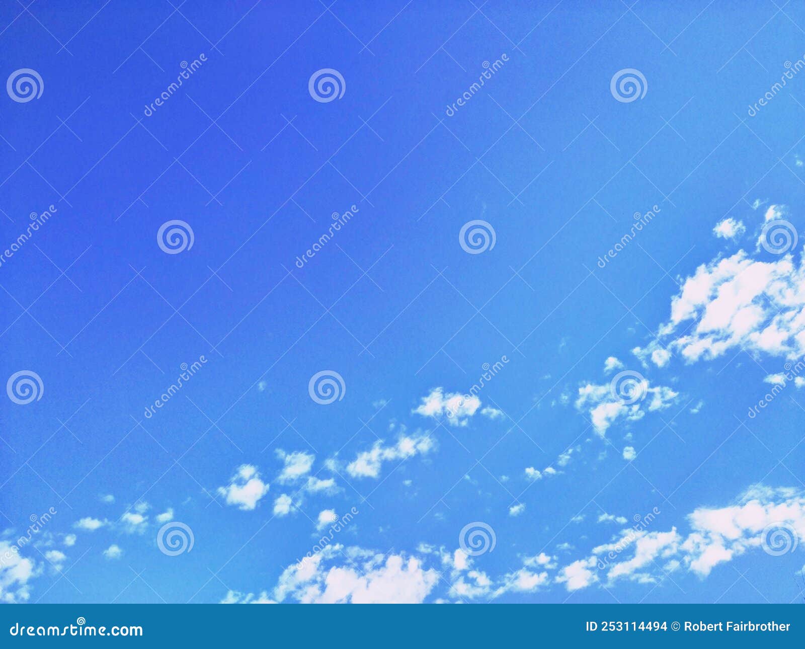 Bright Blue Sky with Scattered Clouds Stock Photo - Image of bright ...