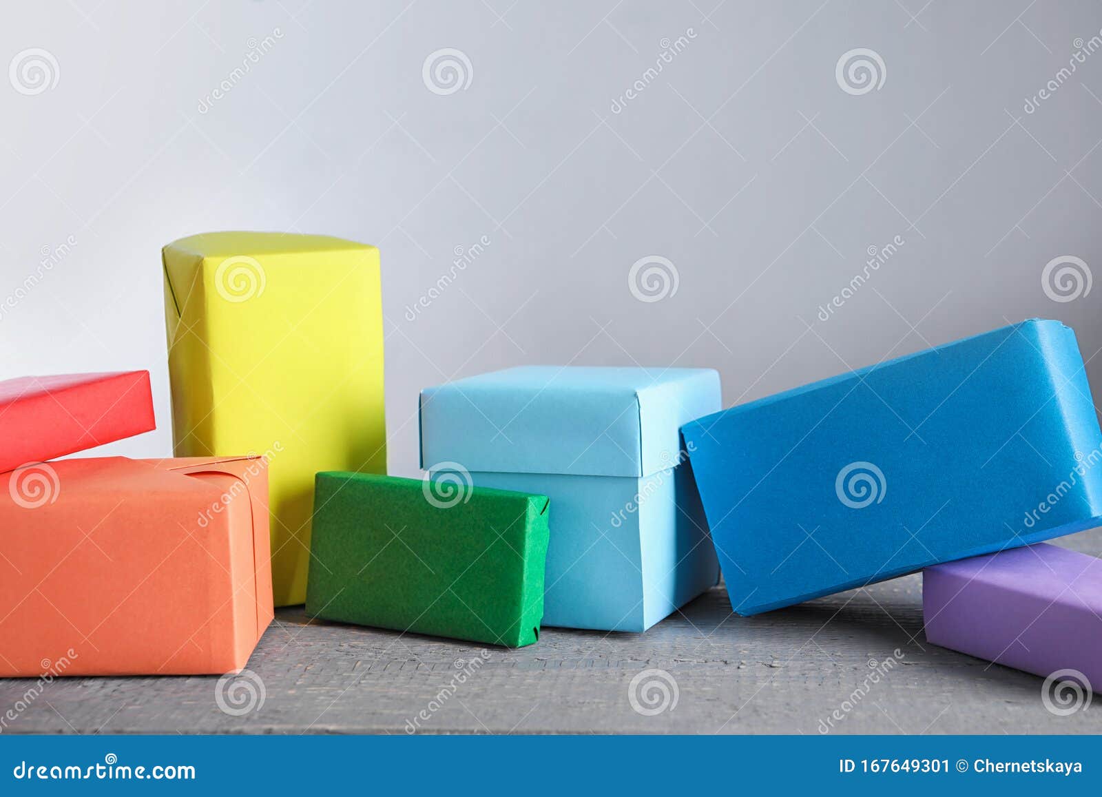 Bright Boxes on Table. Rainbow Colors Stock Image - Image of presents ...