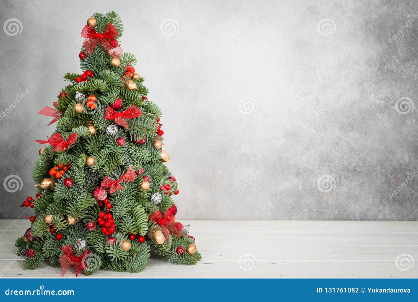 Christmas Tree on a Grey Background with Copy Space. Image for Cards ...