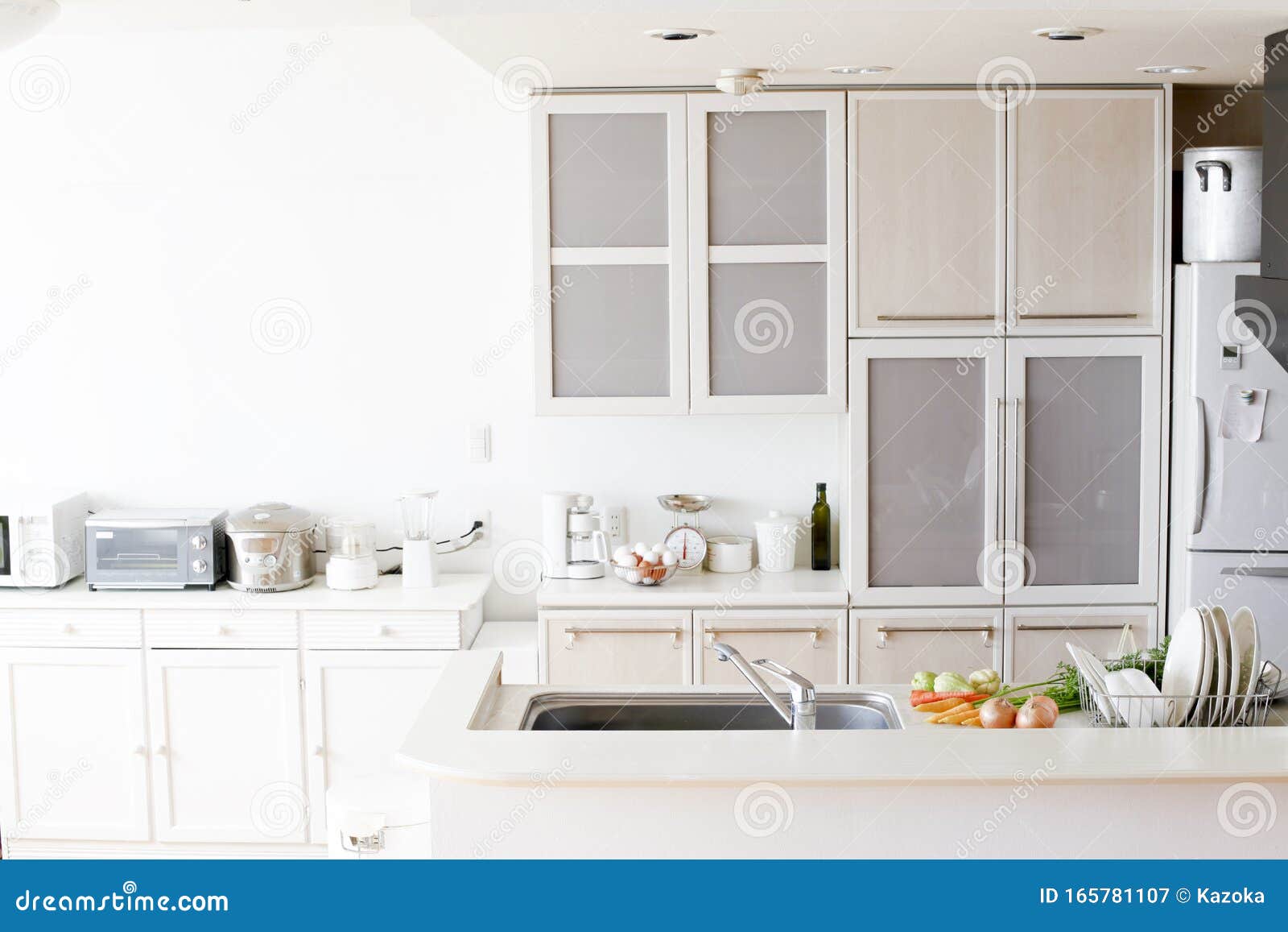 A Bright, Clean White Kitchen with a Compact Stock Image - Image of ...