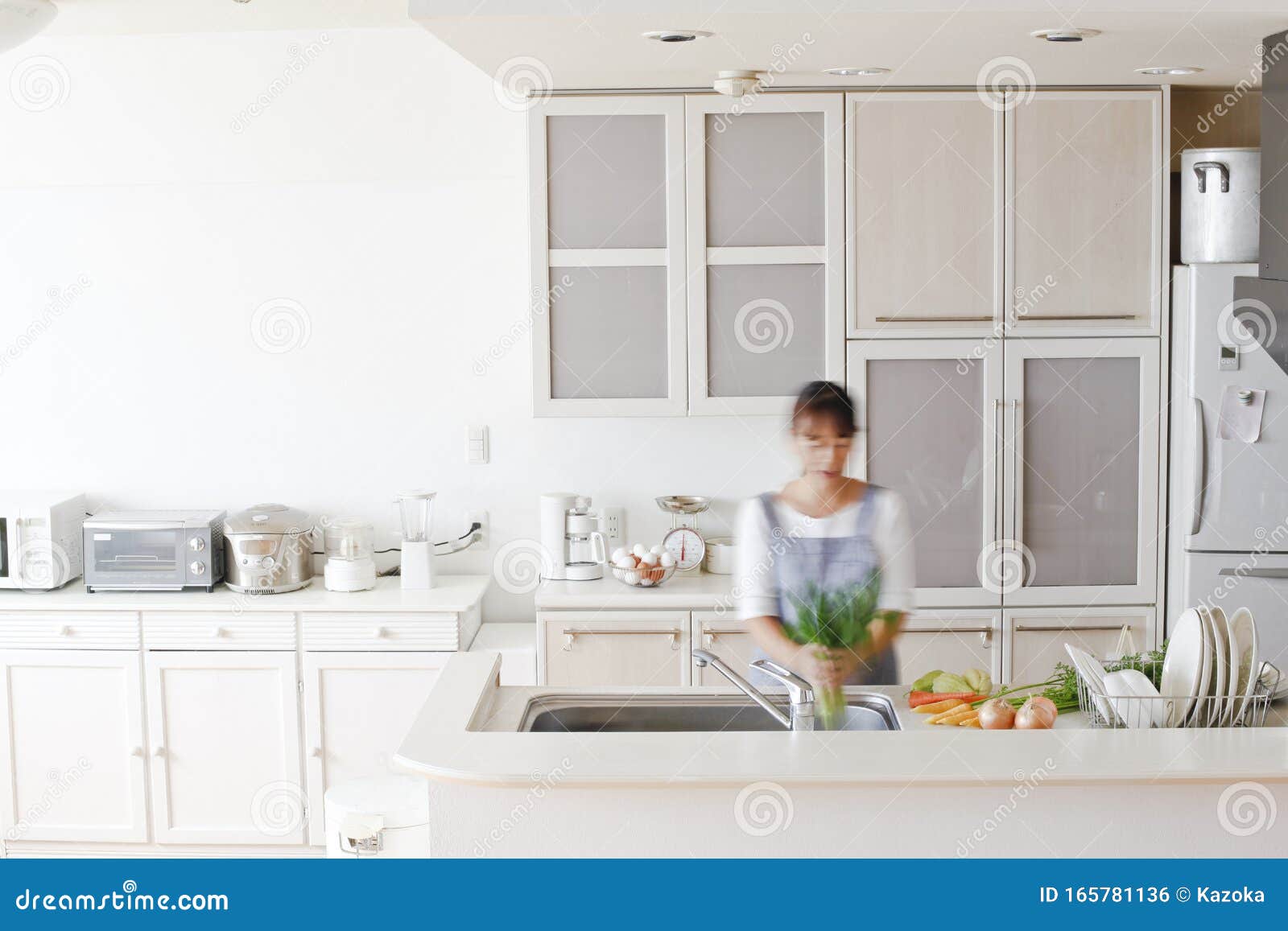 A Bright, Clean White Kitchen with a Compact Stock Photo - Image of ...