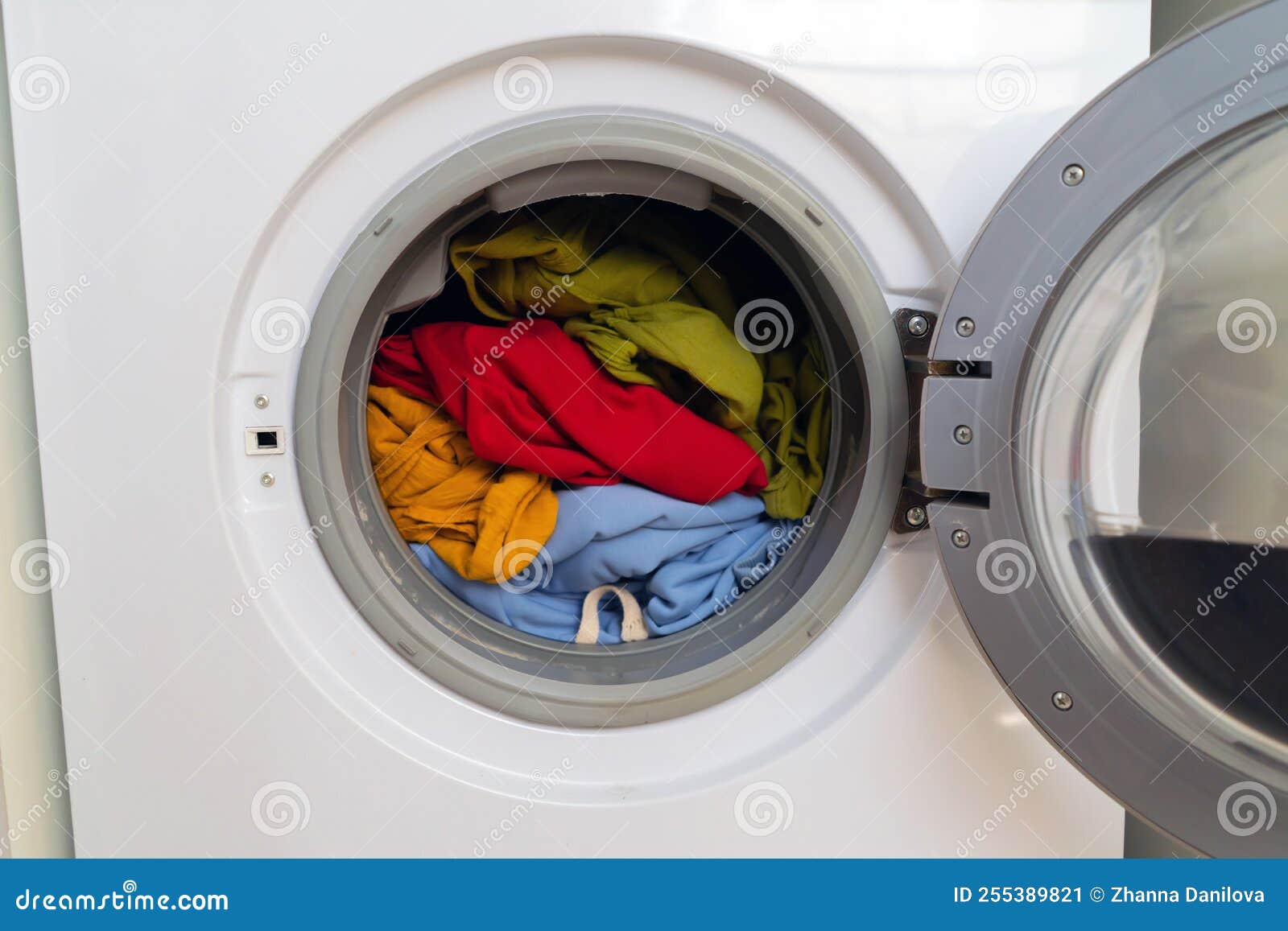 Bright Clothes Inside Washing Machine. Stock Image - Image of closeup ...