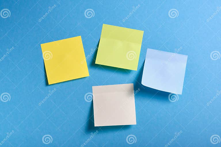 Colored Sticky Notes on Blue Background Stock Image - Image of ...