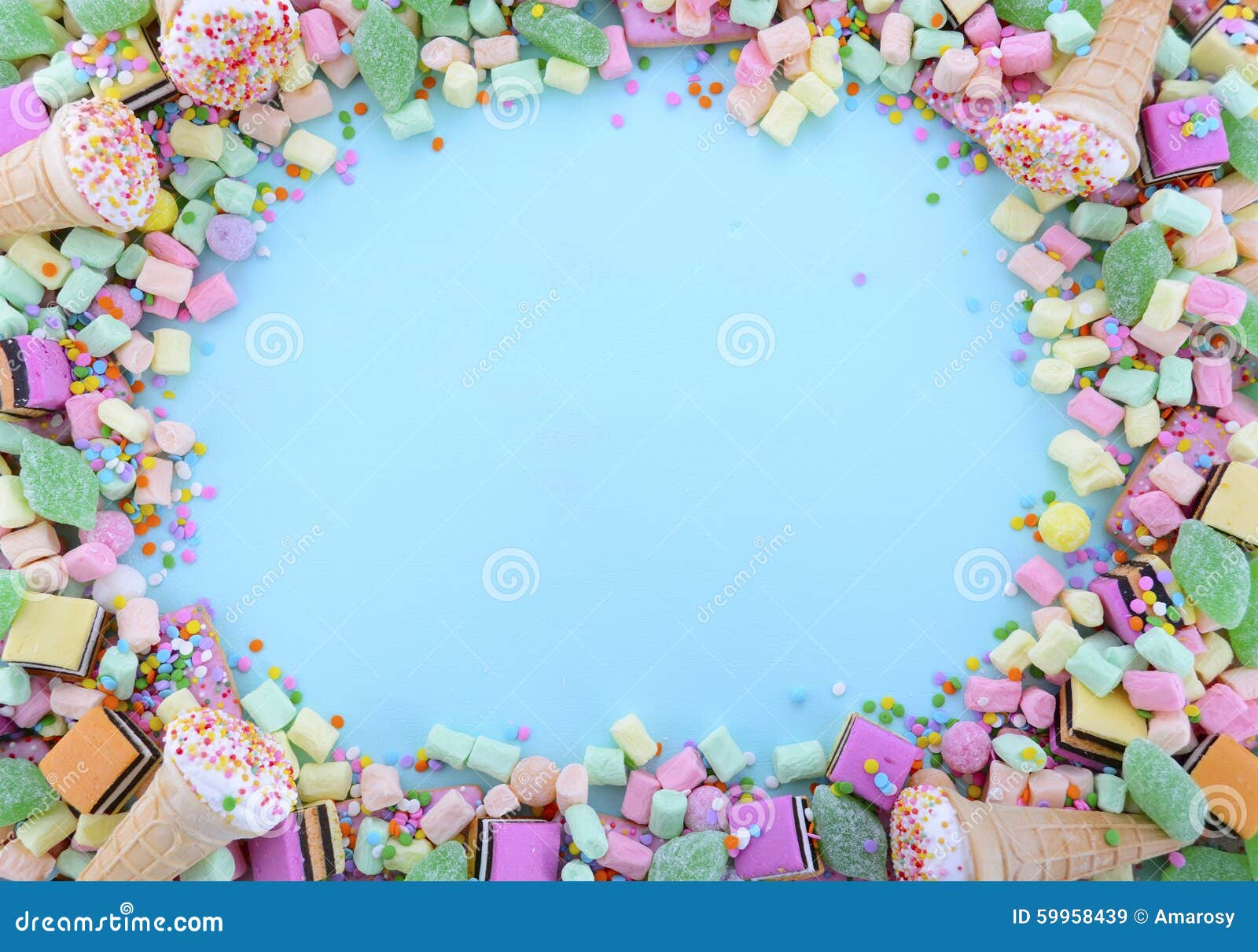 Bright Colorful Candy On Pale Blue Wood Table. Stock Image - Image of ...