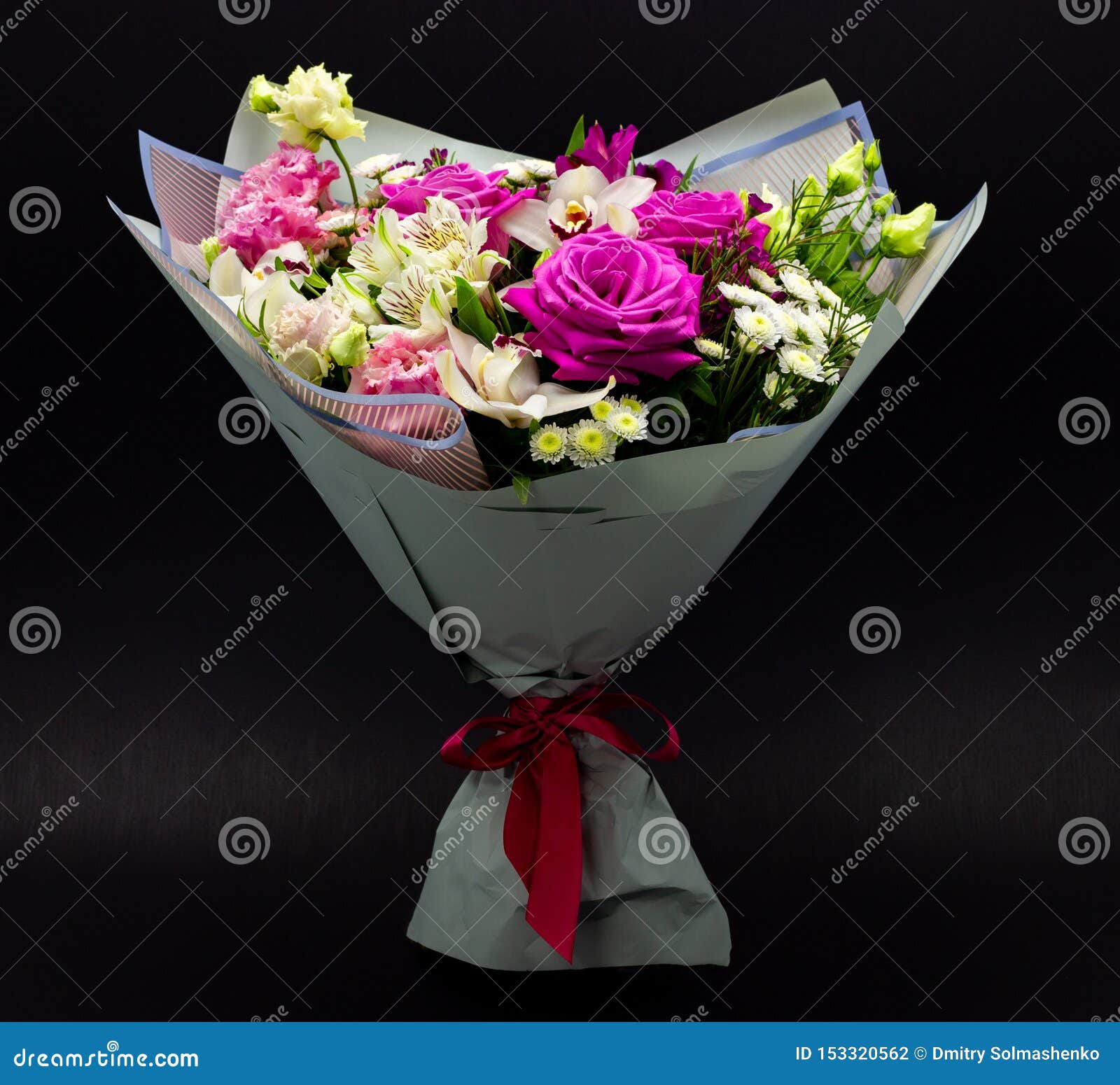 Bright Contrasting Bouquet of Fresh Flowers on a Dark Background Stock ...