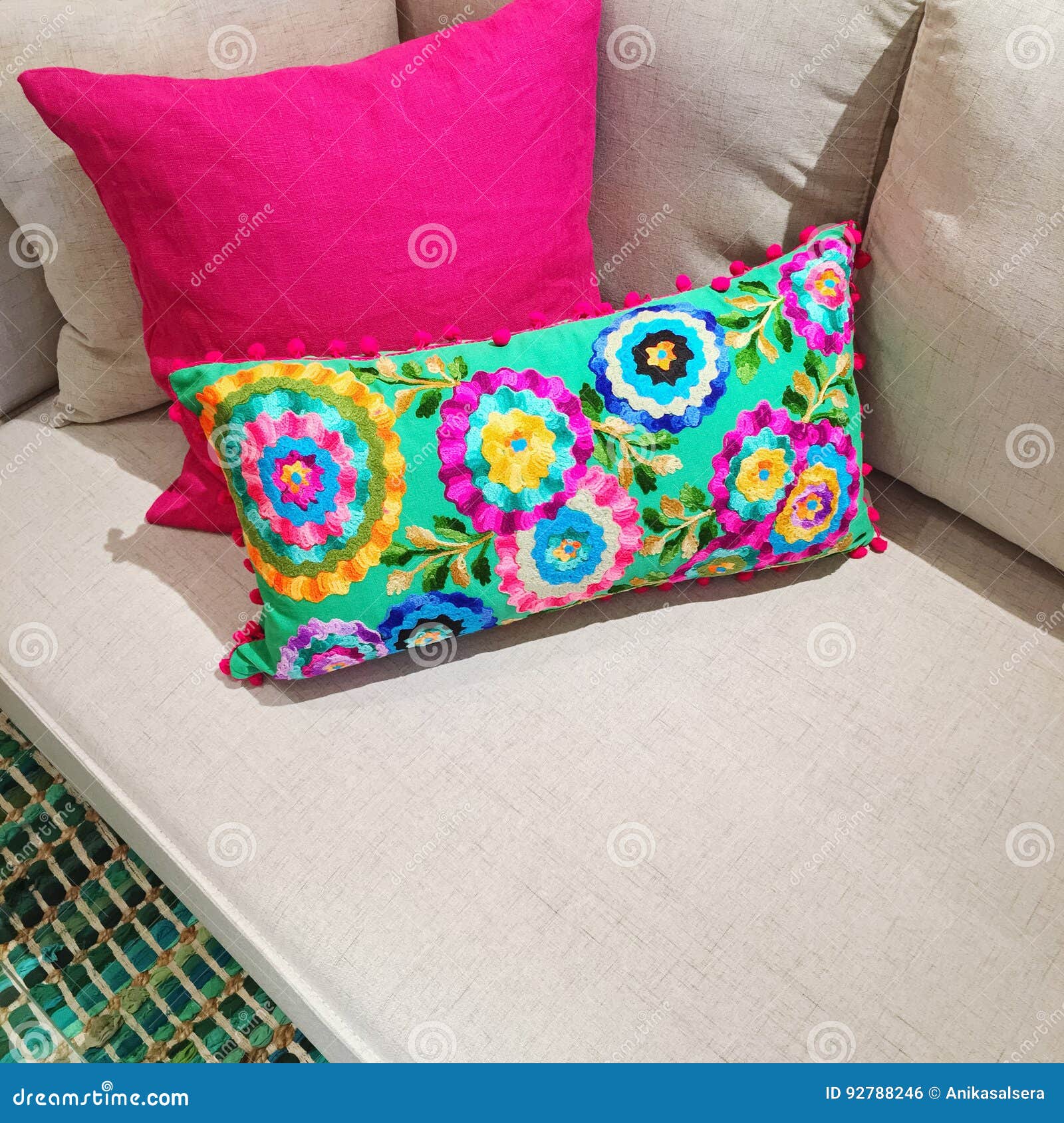Bright Cushions with Floral Design on a Sofa Stock Photo - Image of ...