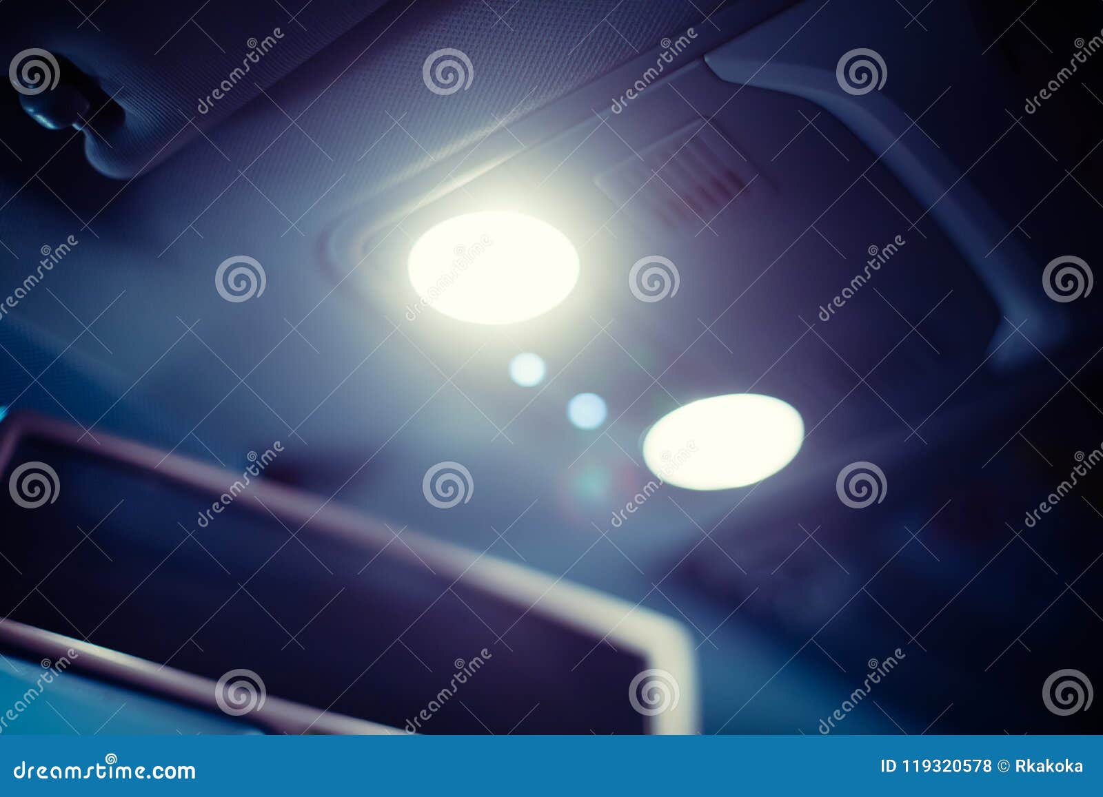 Bright Dramatic Car Interior Lights Shining Beams of Light with Rear ...