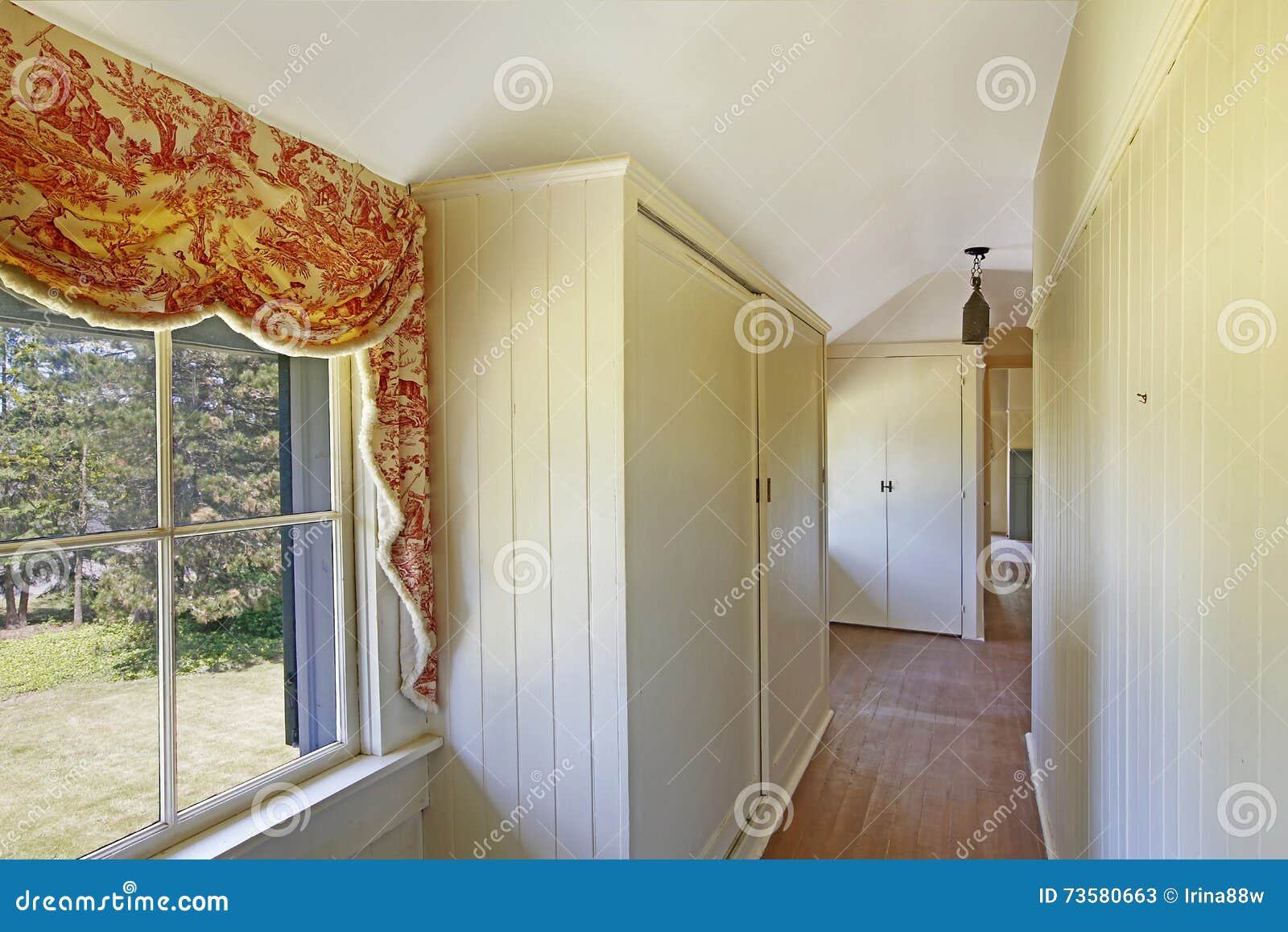 Bright Empty Hallway with Hardwood Floor and Vaulted Ceiling. Stock ...