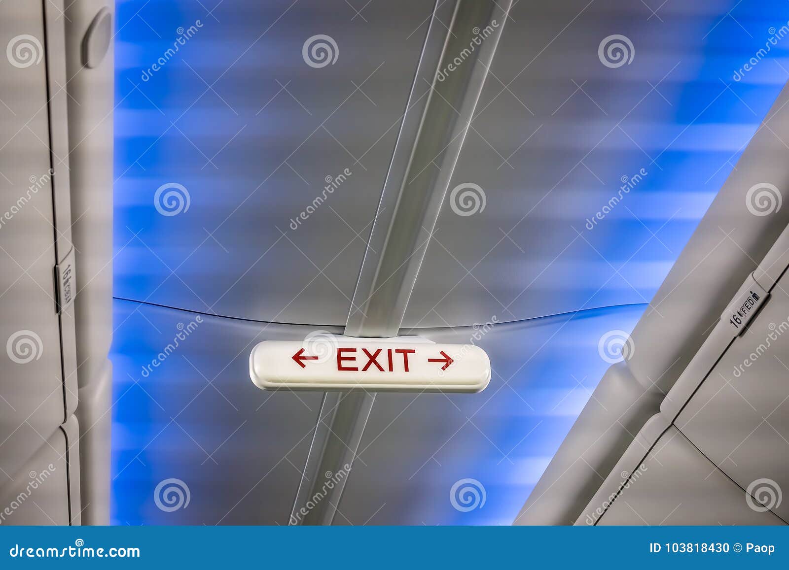 Bright Exit Sign in the Modern Jet Plane Stock Photo - Image of ...