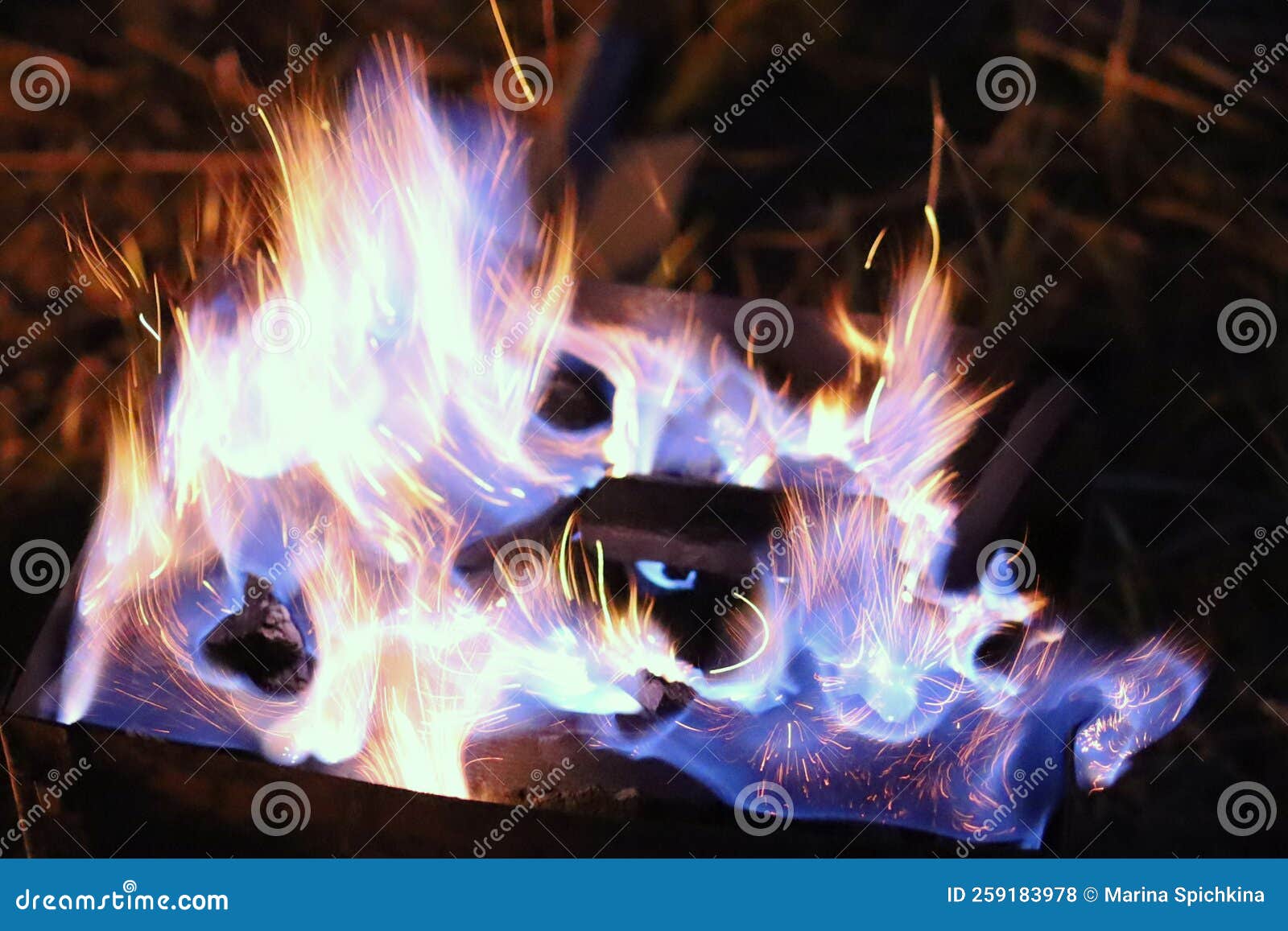 Bright Fire with Blue Flashes of Flame Stock Photo - Image of border ...