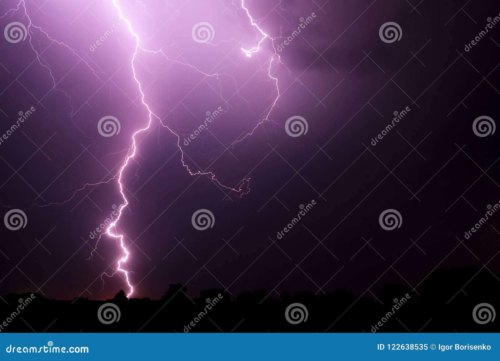 Bright Flash of Lightning Illuminated the Night Sky and Dyed Clouds in ...