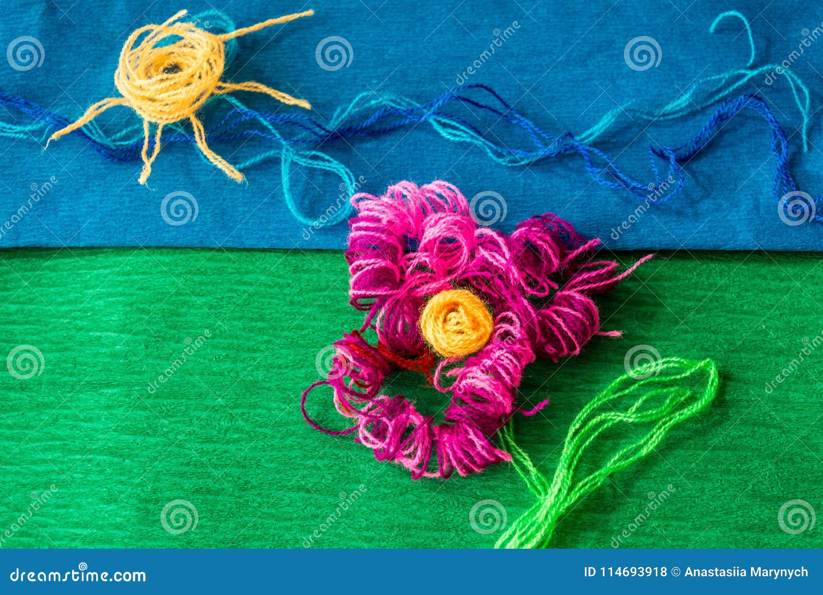 Bright Flower Made of Threads on Green Background Stock Photo - Image ...