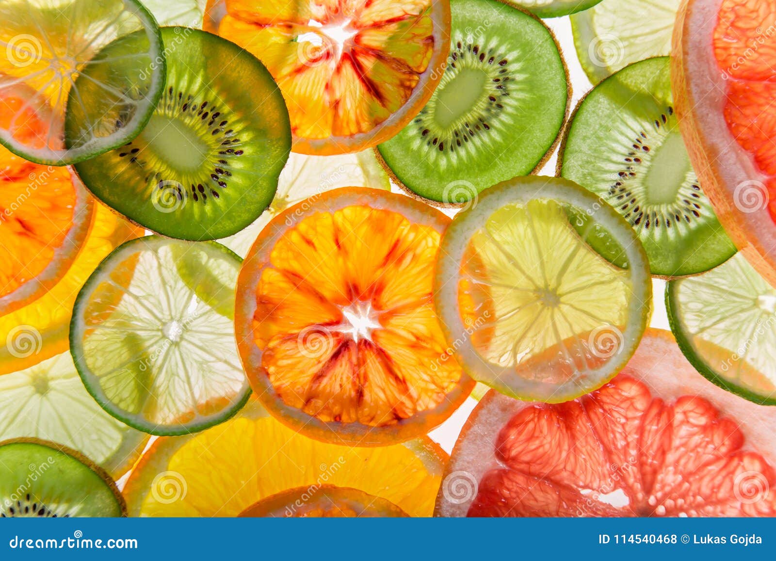 Bright Fresh Citrus Slices, Back Light Transparent Fruit. Stock Photo ...