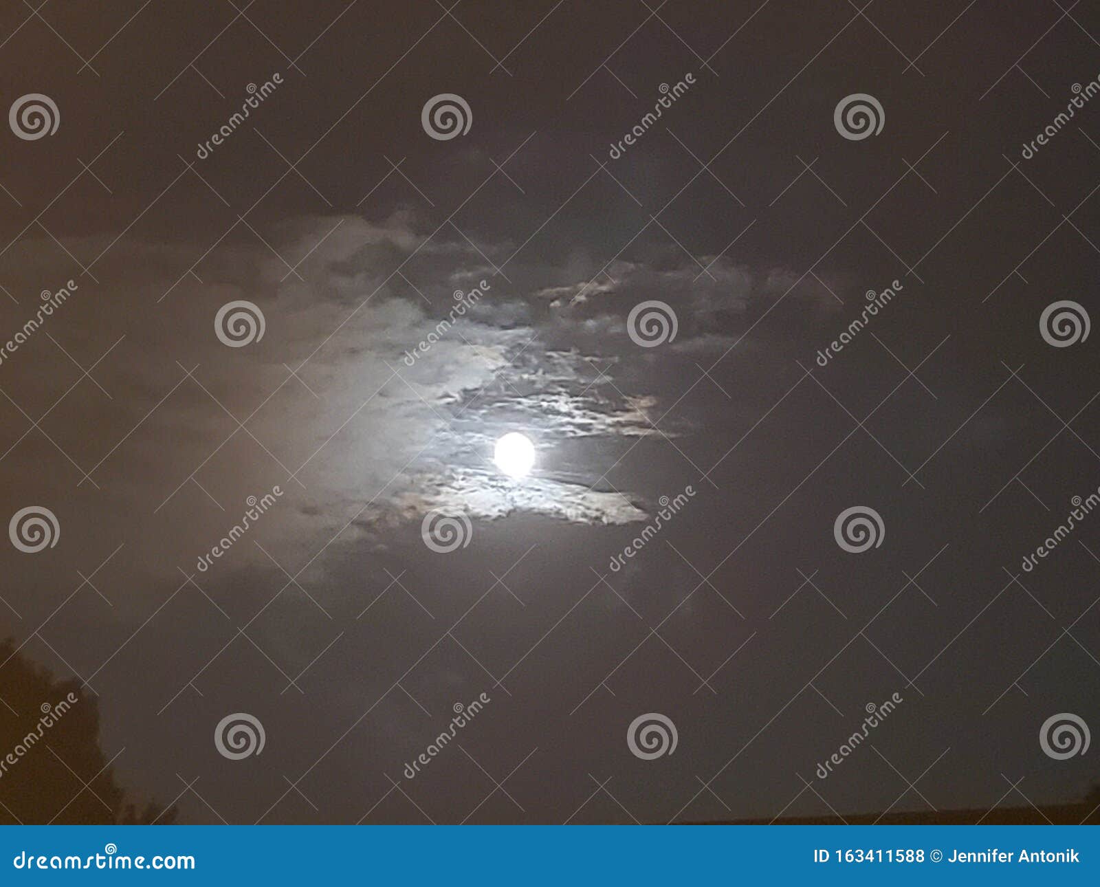 Bright Full Moon Behind Clouds Stock Photo - Image of night, clouds ...