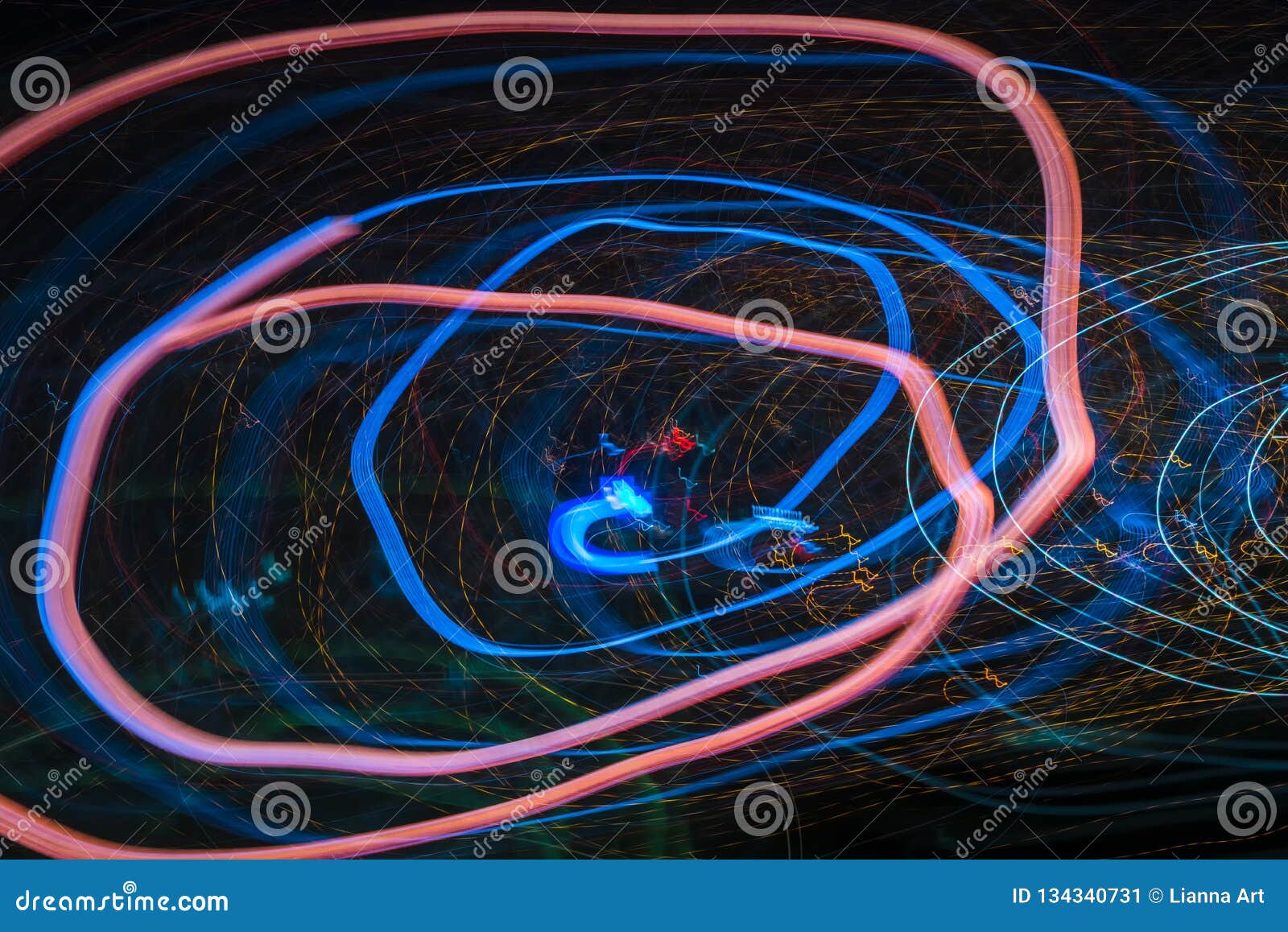 Bright Glow Spiral Patterns from Light Strips on a Black Background ...