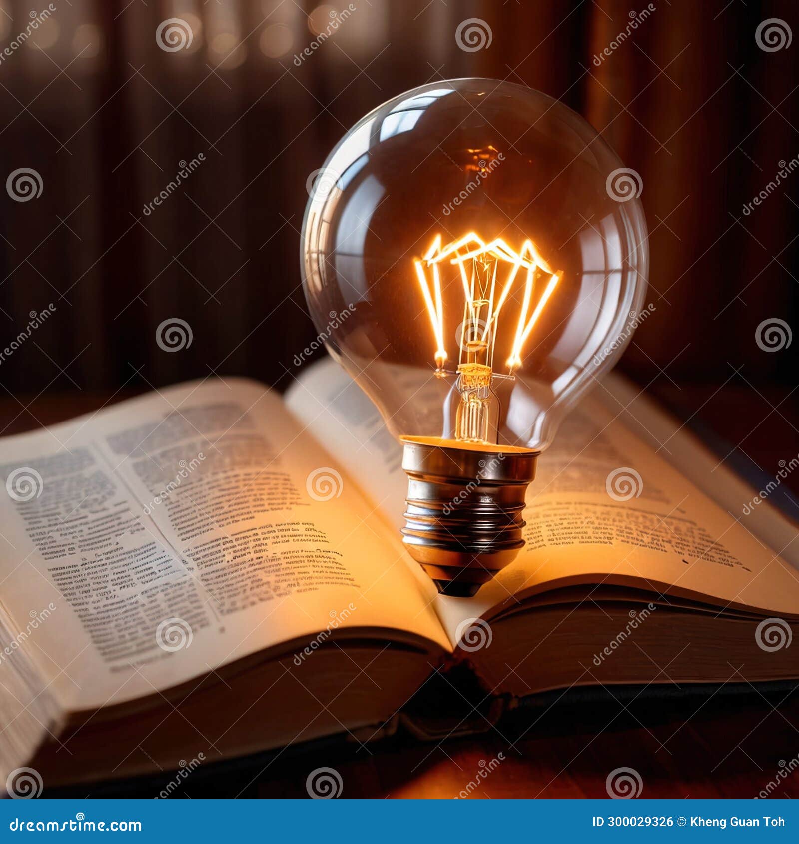 Bright Glowing Lightbulb on Open Book, Showing Enlightenment and ...