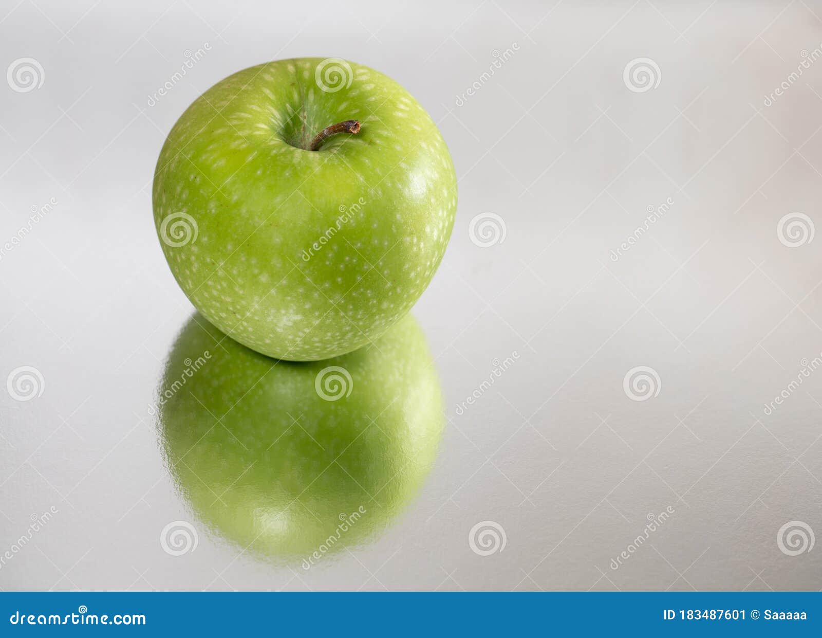Bright Green Apple Isolated and Reflected, Closeup Stock Image - Image ...