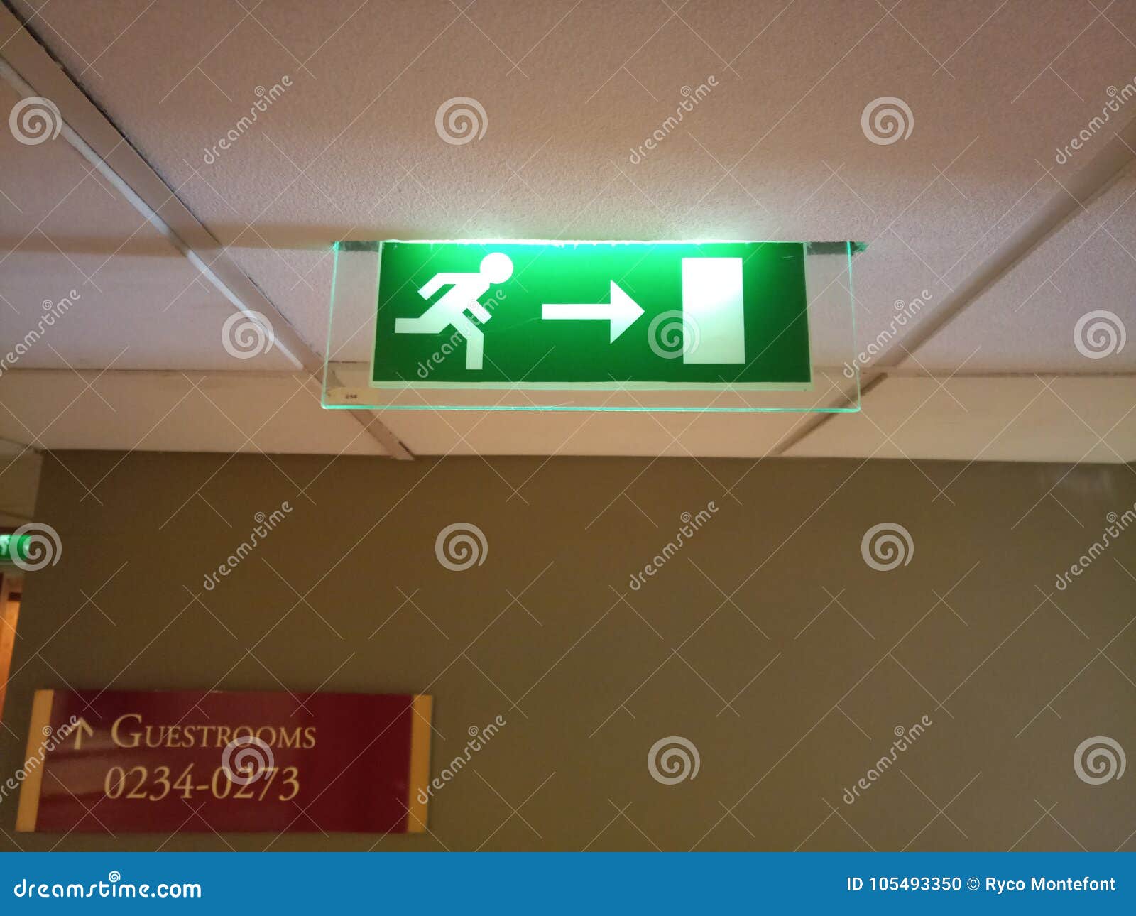 Bright Green Fire Exit Sign Stock Photo - Image of sign, white: 105493350