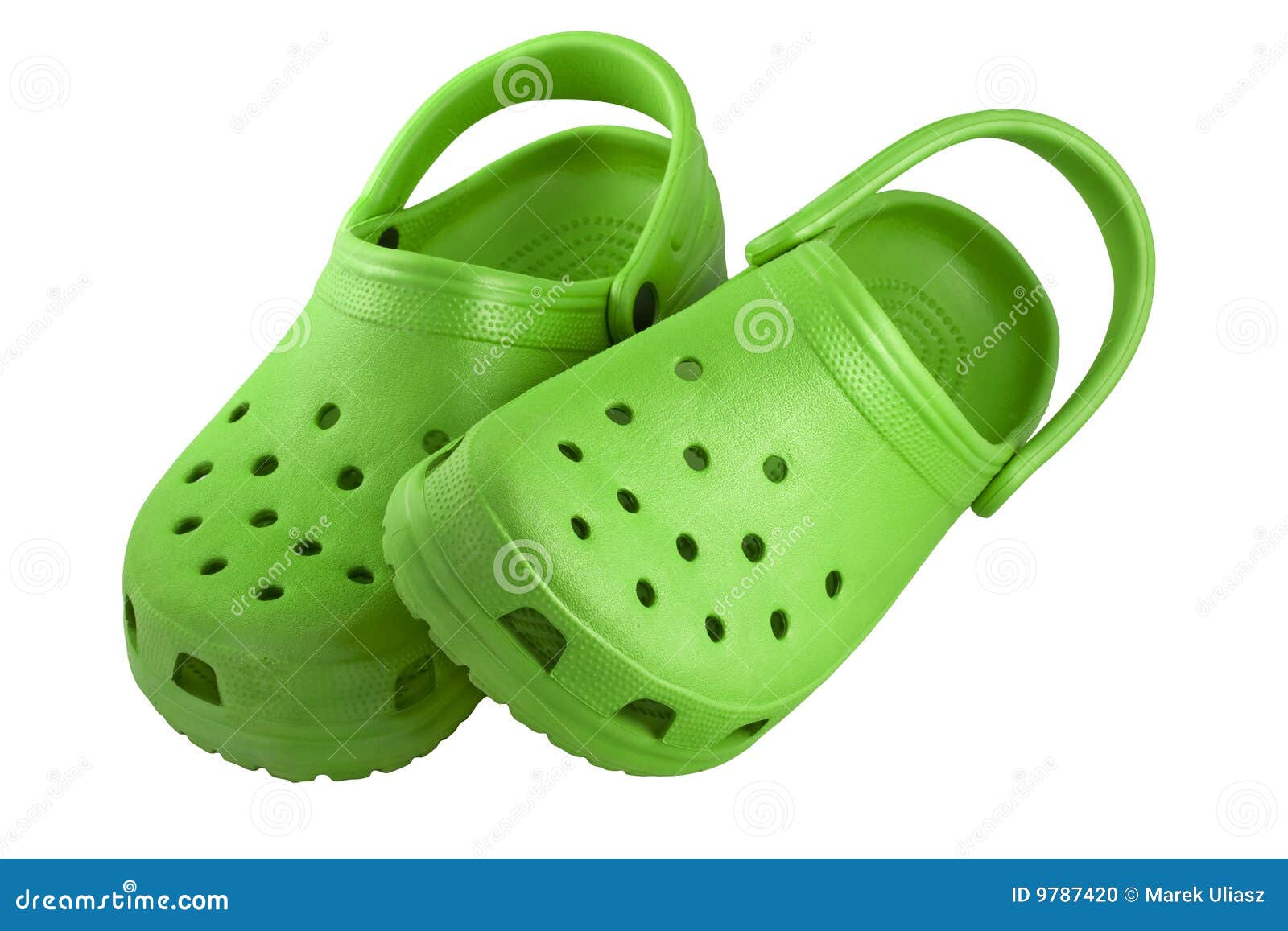 Bright green plastic clogs stock photo. Image of white - 9787420