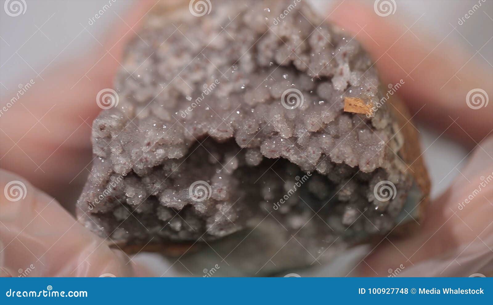 Bright Grey Ruby Crystal Ore in Hands with Gloves. Crystallization is ...