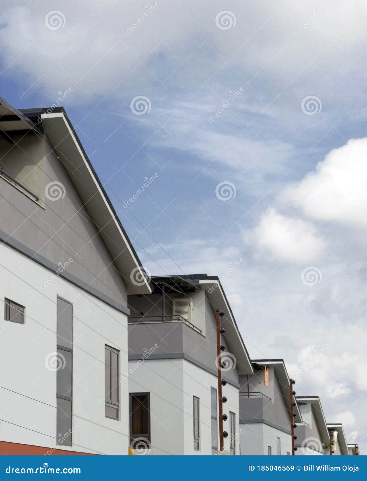 Bright houses together stock image. Image of cottage - 185046569