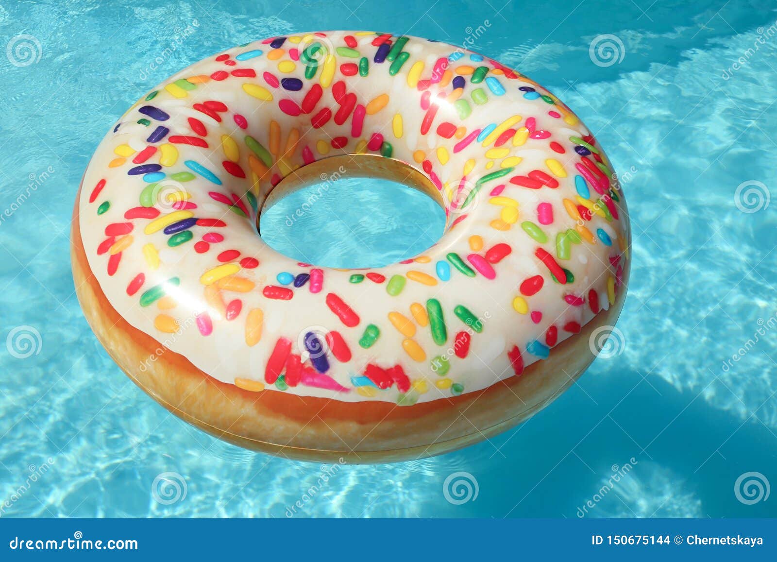 Bright Inflatable Doughnut Ring Floating in Swimming Pool Stock Photo ...