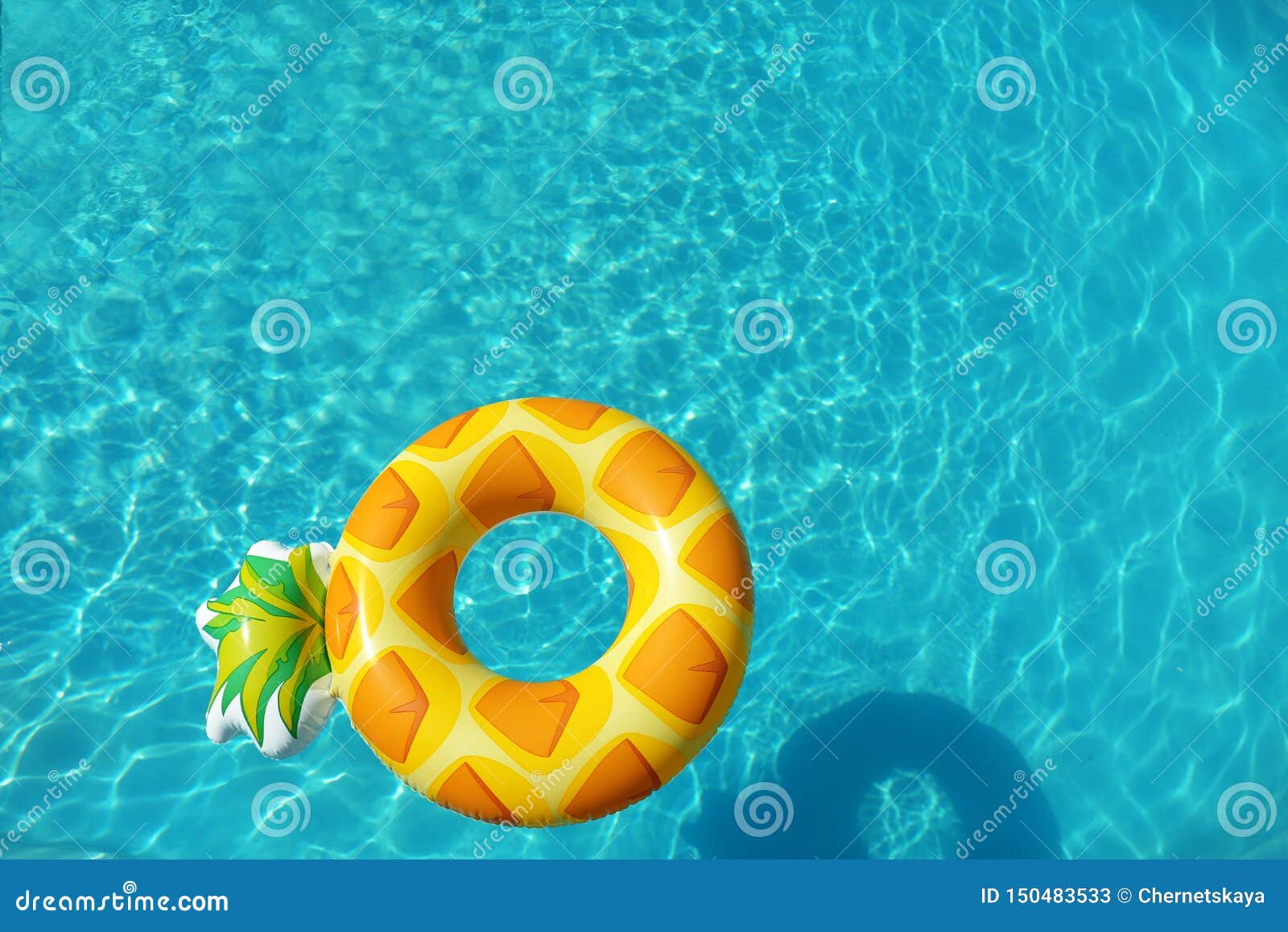 Bright Inflatable Pineapple Ring Floating in Swimming Pool on Sunny Day ...