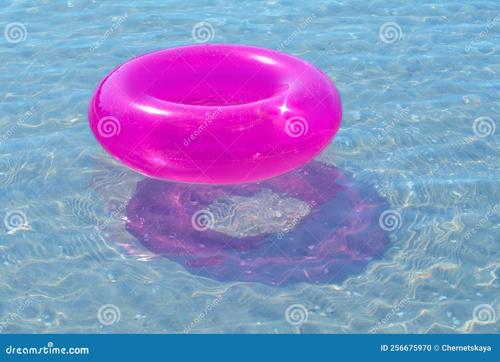 Bright Inflatable Ring Floating on Sea Water Stock Photo - Image of ...