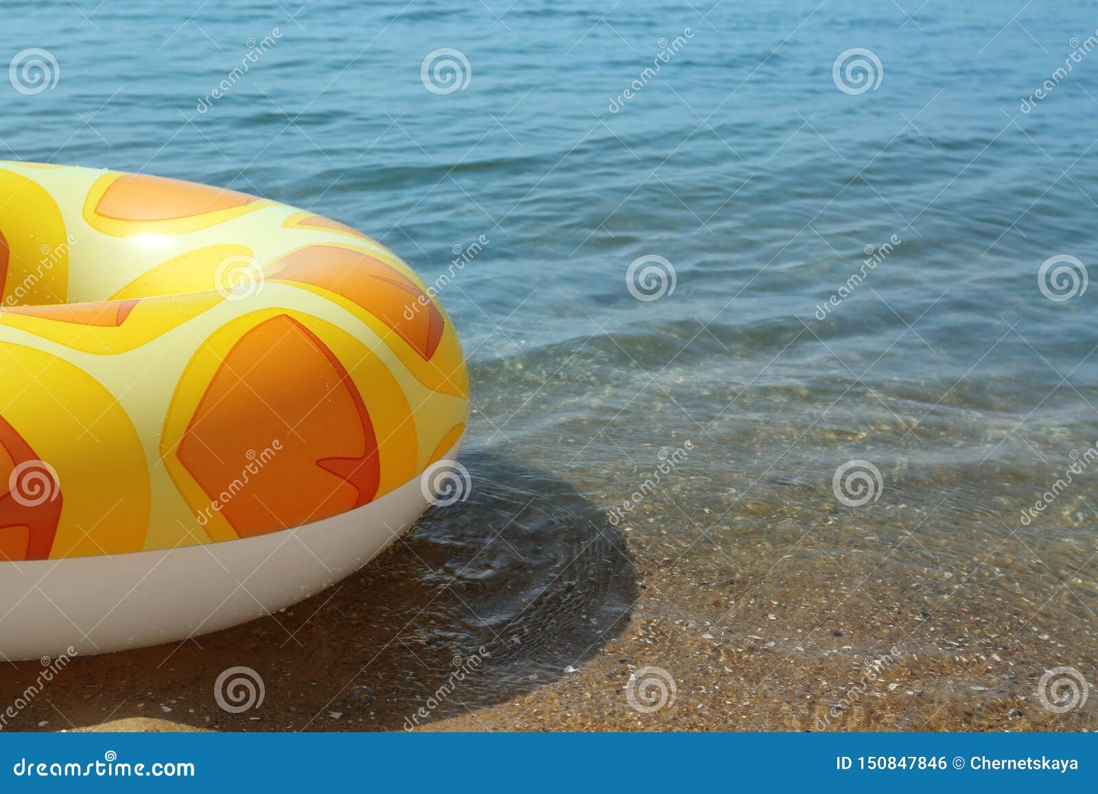 Bright Inflatable Ring Floating on Sea Water Stock Photo - Image of ...