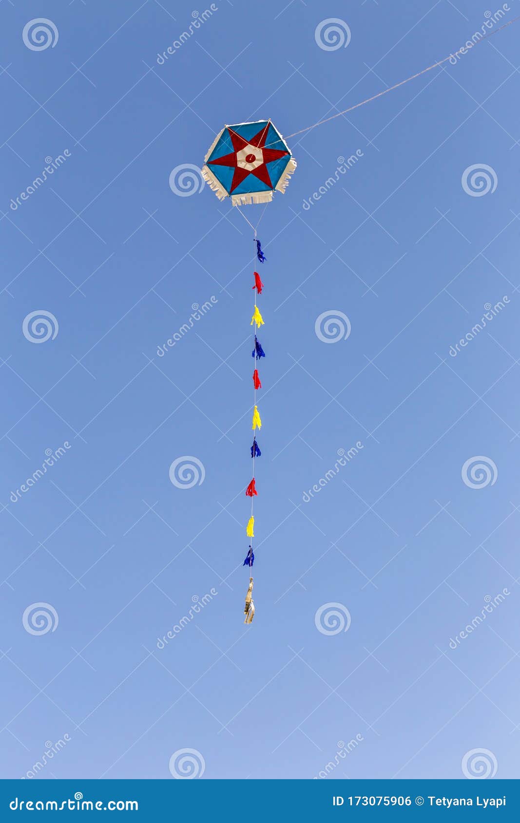 Bright Kite with a Pattern in the Blue Sky Stock Photo - Image of ...