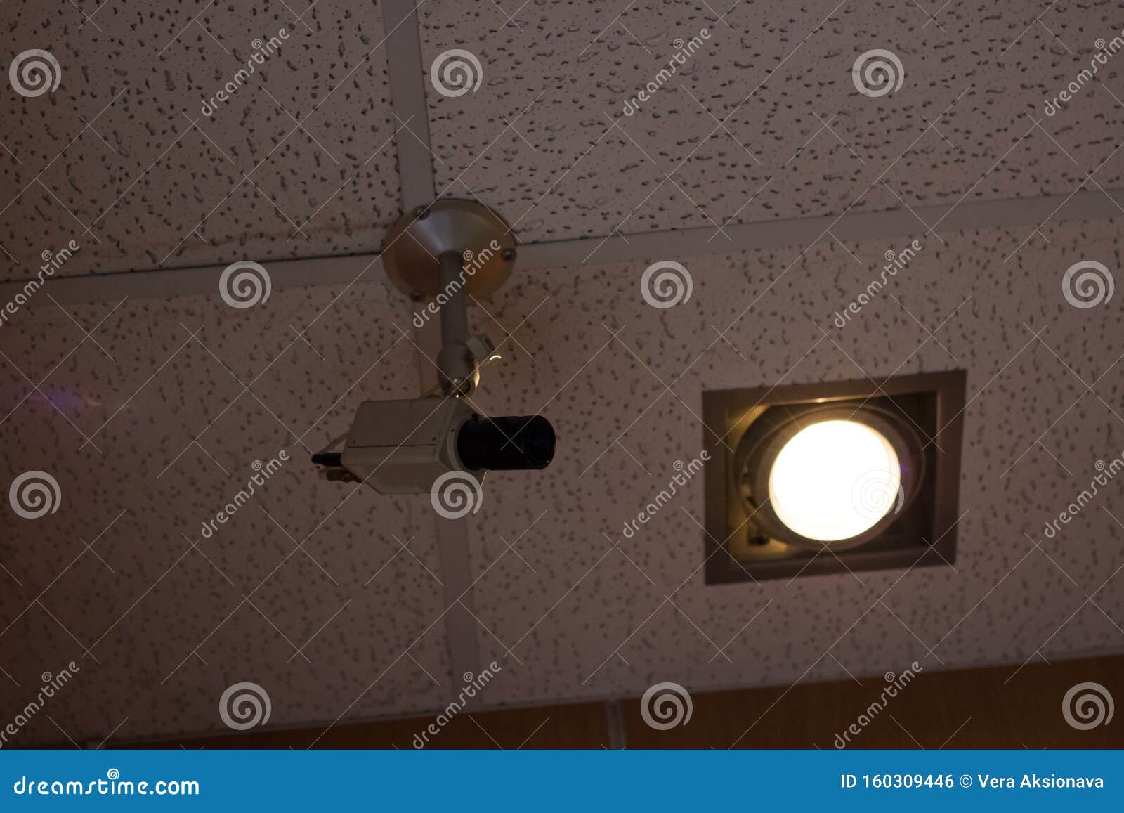 Bright Lamp and CCTV Camera on the Ceiling Stock Photo - Image of light ...