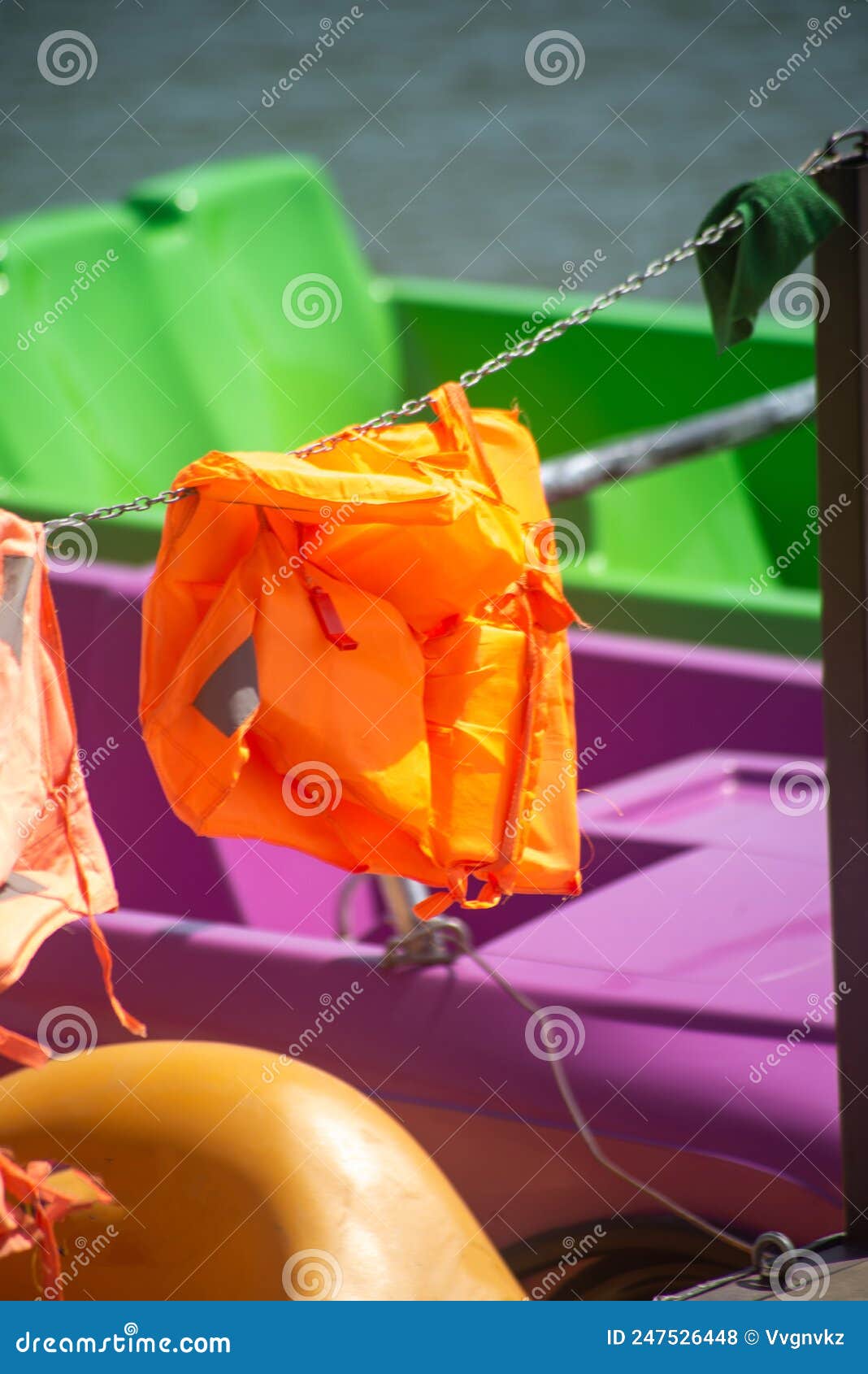 Bright Life Jackets Hanging on the Dock Stock Photo - Image of ring ...