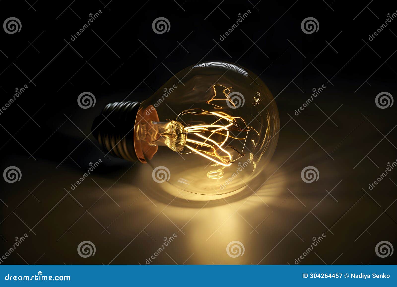 Bright Light Bulb Casting a Glow in Shadows Stock Image - Image of glow ...