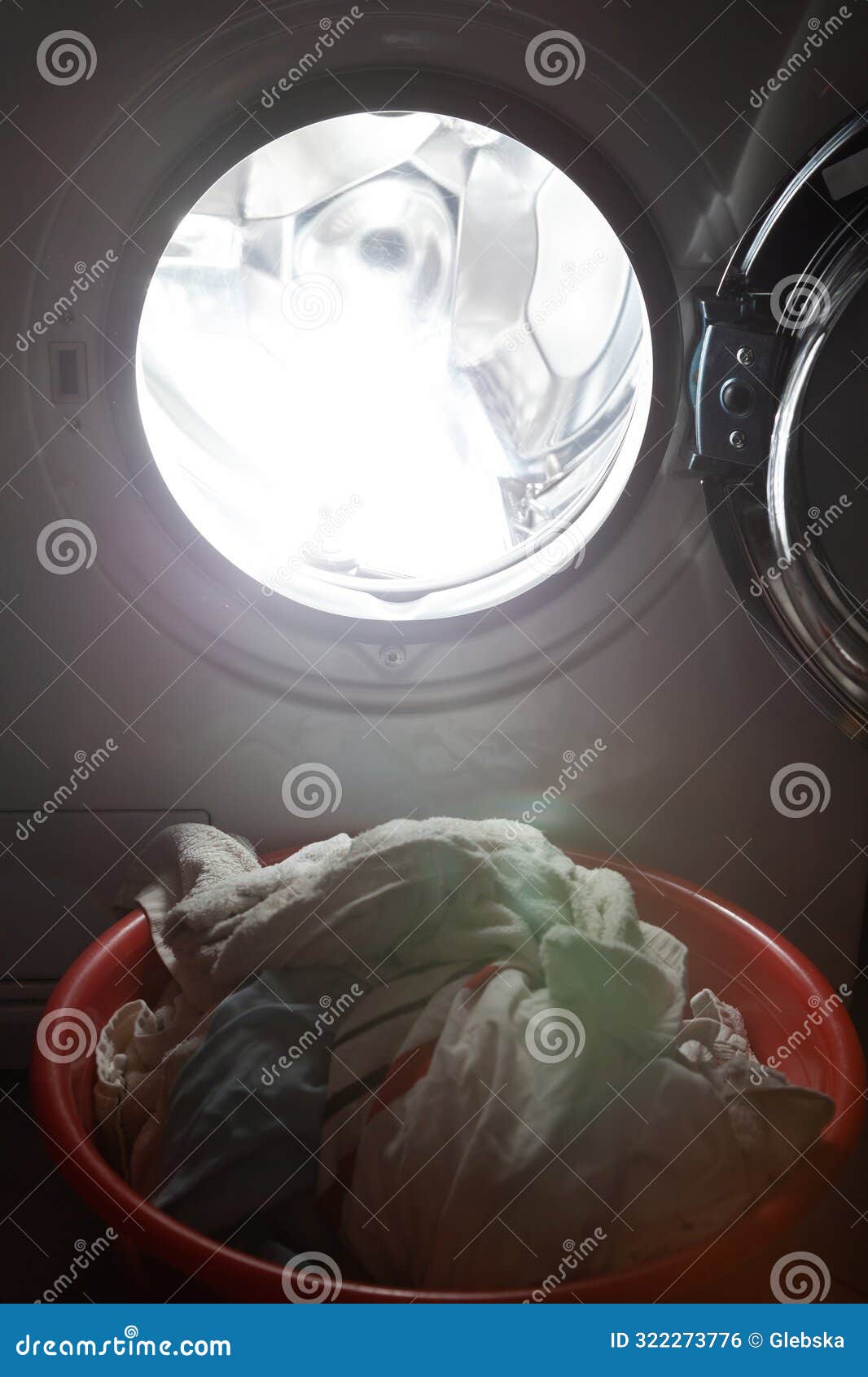 Bright Light Comes from the Hatch of the Washing Machine Stock Photo ...