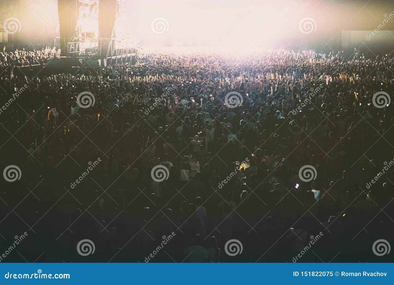 The Bright Light of the Stage Illuminates a Huge Concert Crowd Stock ...