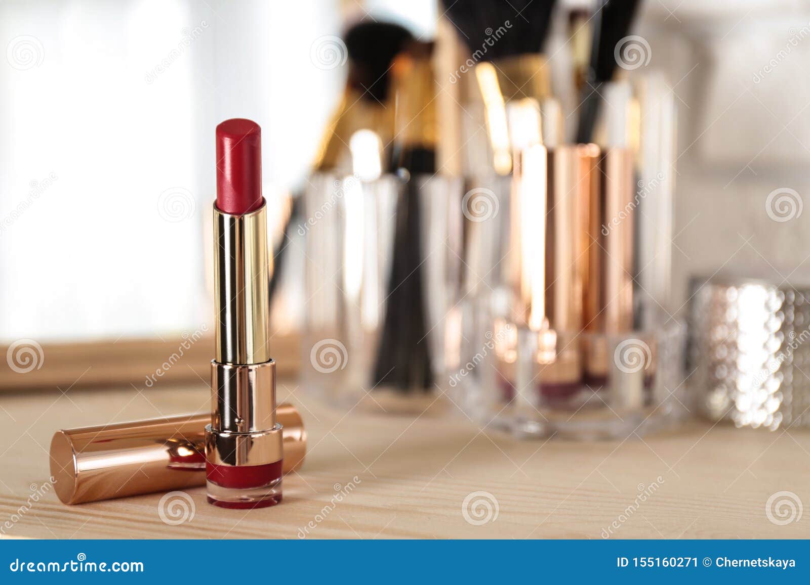 Bright Lipstick in Gold on Dressing Table, Space for Text Stock Image ...