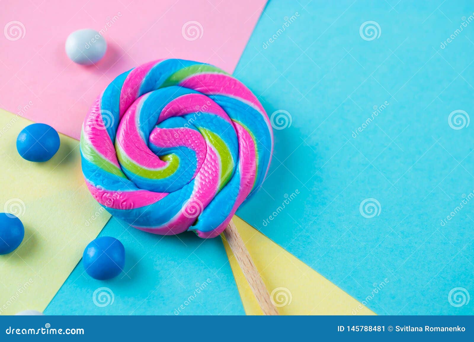 Bright Lollipop Candy on Colorful Background, Flat Lay Shot Stock Image ...