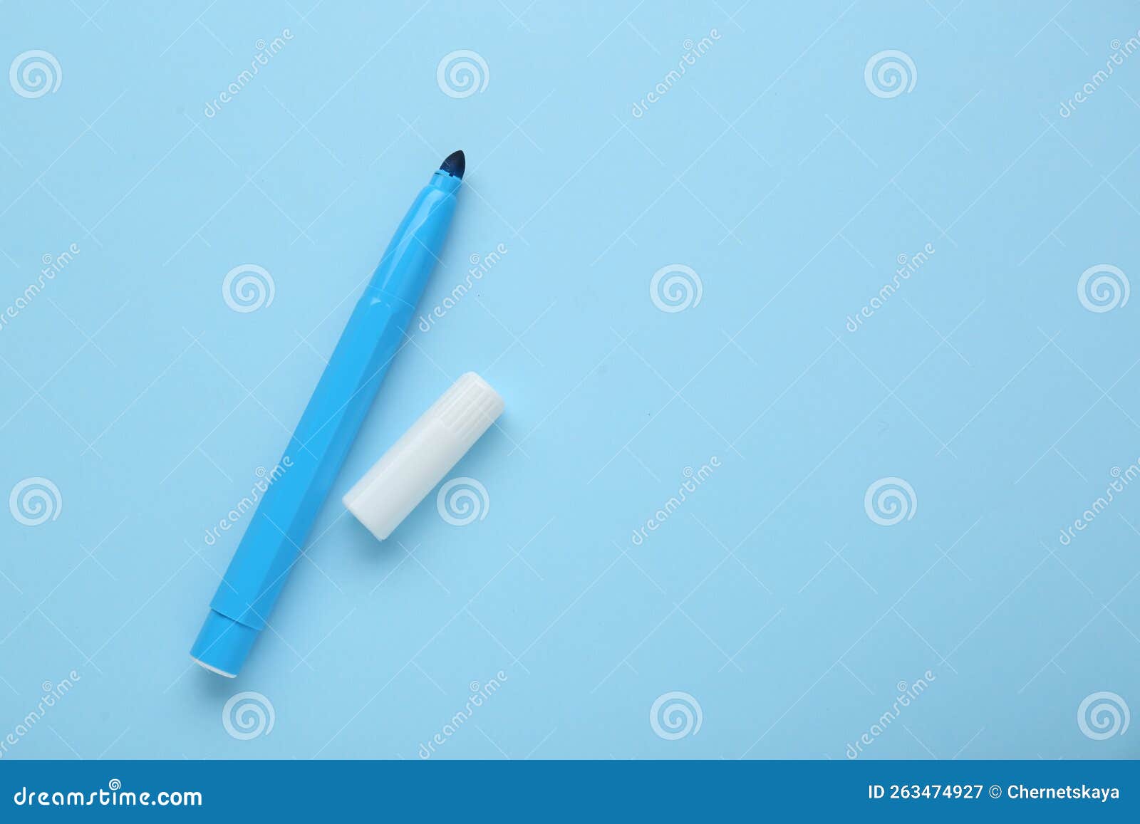 Bright Marker and Cap on Light Blue Background, Flat Lay. Space for ...