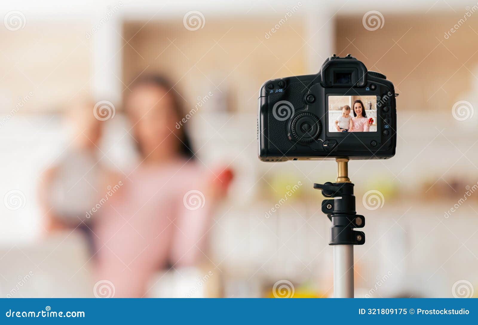 Woman Recording Cooking Tutorial in Modern Kitchen during Daytime Stock ...