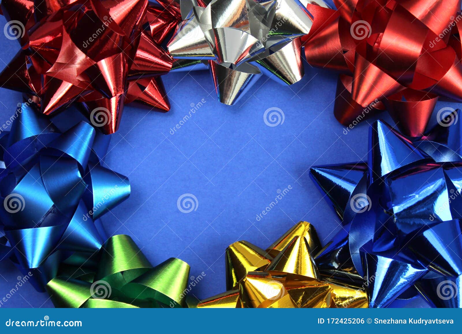 Bright Multi-colored Bows in the Form of Stars on a Blue Background ...