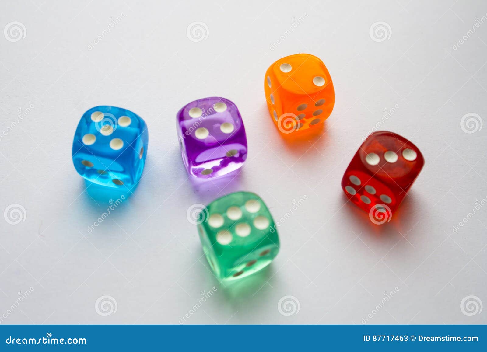 Bright multi-colored dice stock image. Image of gambling - 87717463