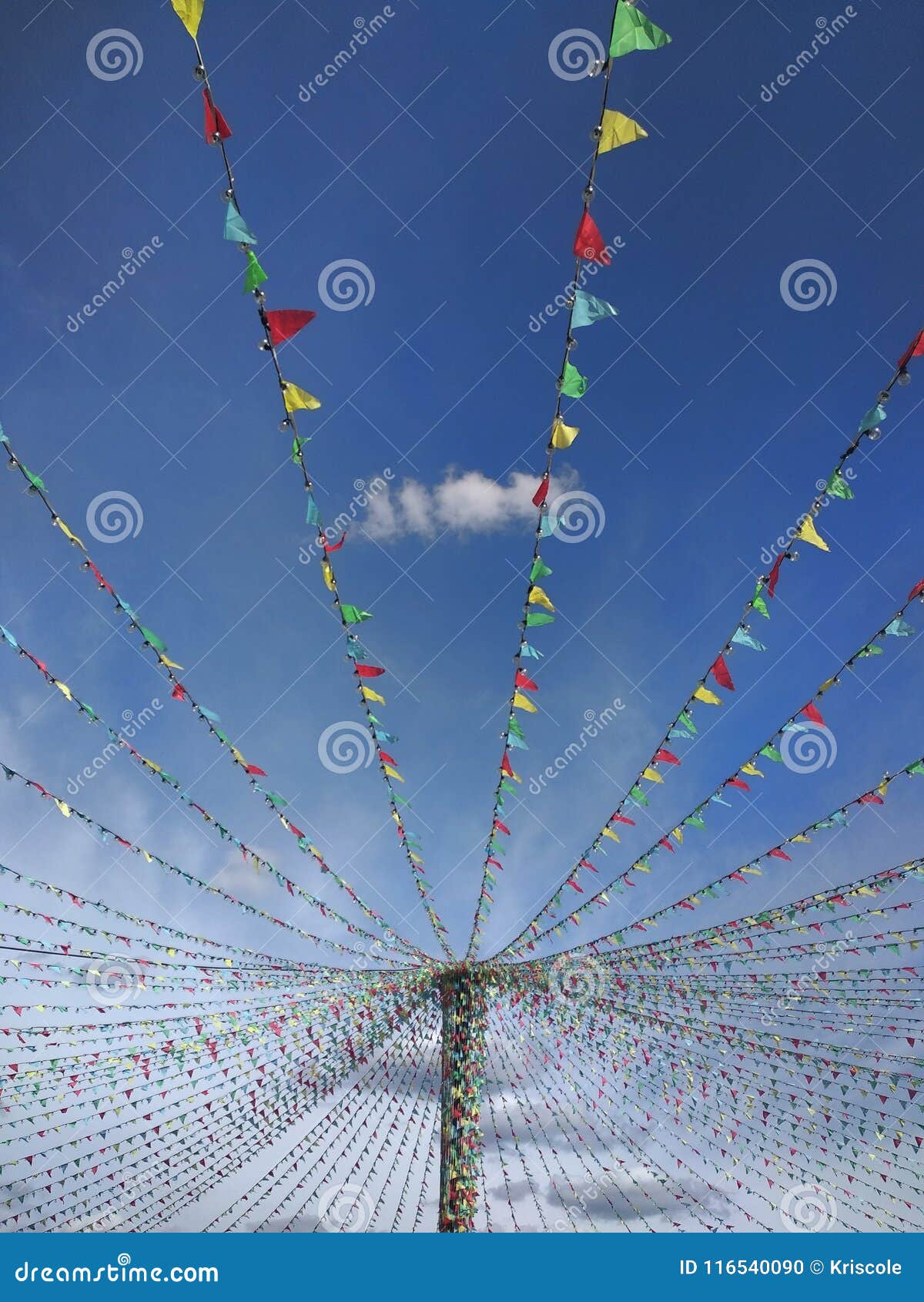 Bright, Multi-colored Flags on a Blue Sky Background. Stock Photo ...