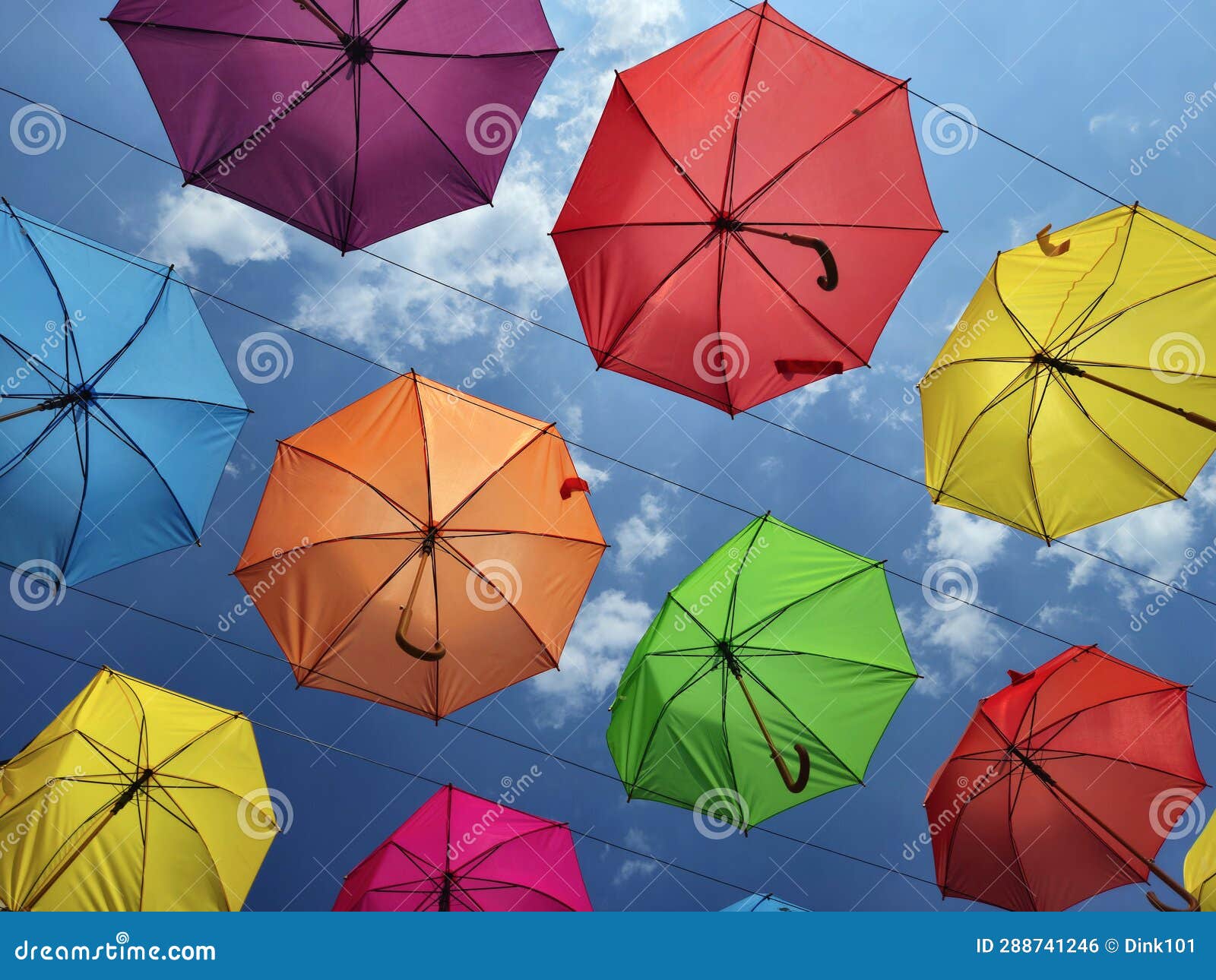 Bright Multi-colored Umbrellas in the Form of Decoration Against the ...