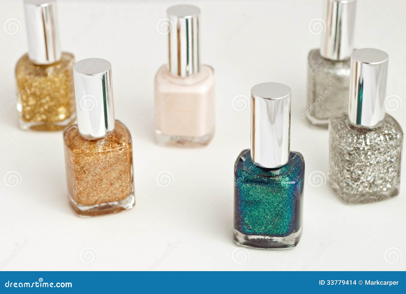 Bright Nail Polish Containers Against White Stock Photo - Image of ...