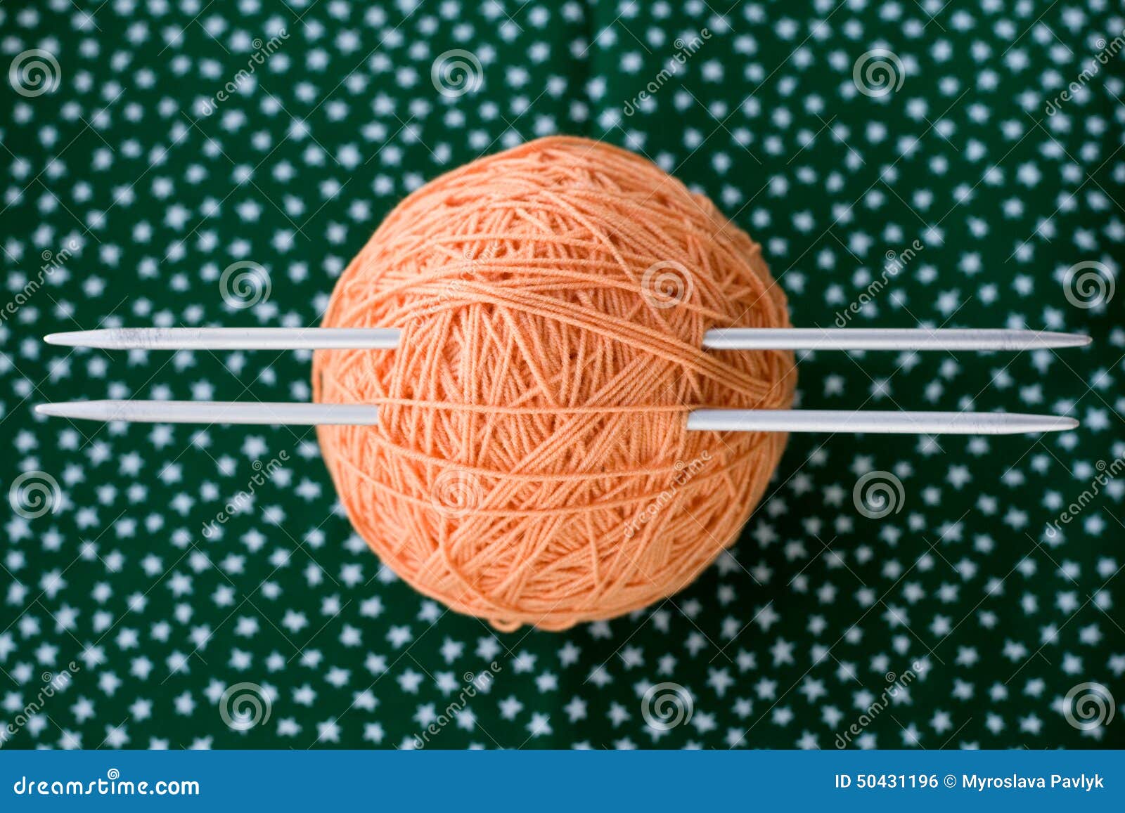 A Bright Orange Ball of Yarn and Needles for Knitting Stock Photo ...