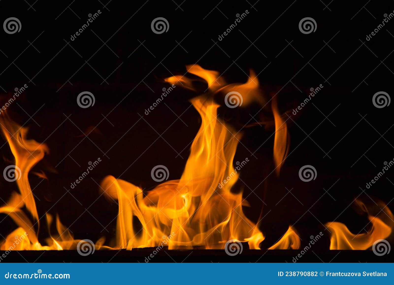 Bright Orange Bonfire Flame on a Black Background. Abstract Fiery ...