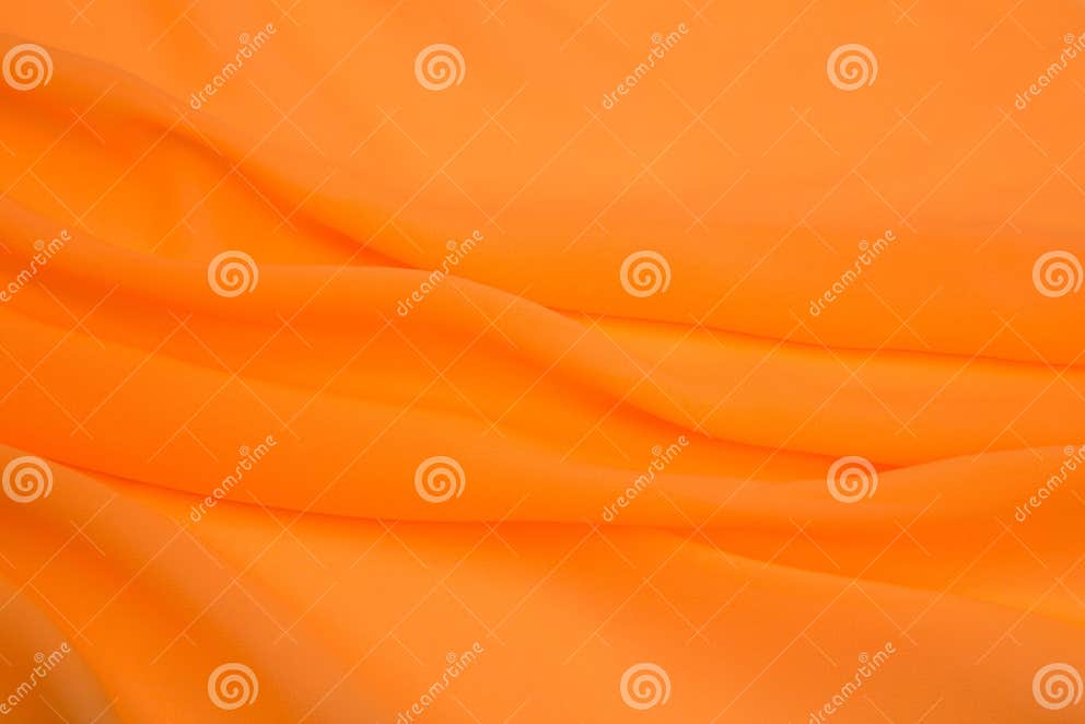 Bright Orange Fabric Lined with Soft Folds Stock Image - Image of ...