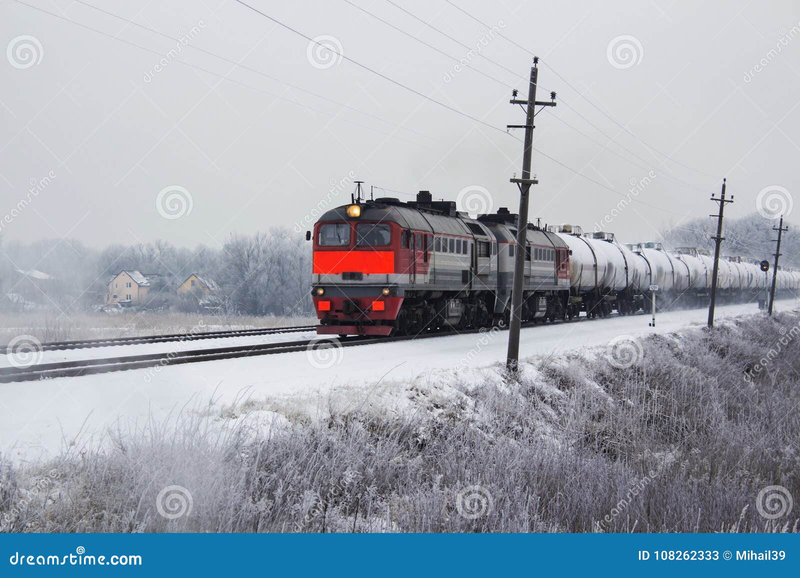 A Bright Orange Freight Train on the Move in Winter. Stock Image ...