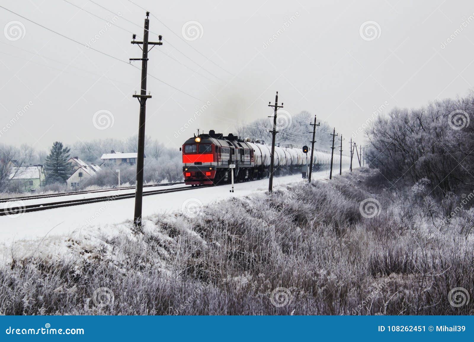 A Bright Orange Freight Train on the Move in Winter. Stock Image ...